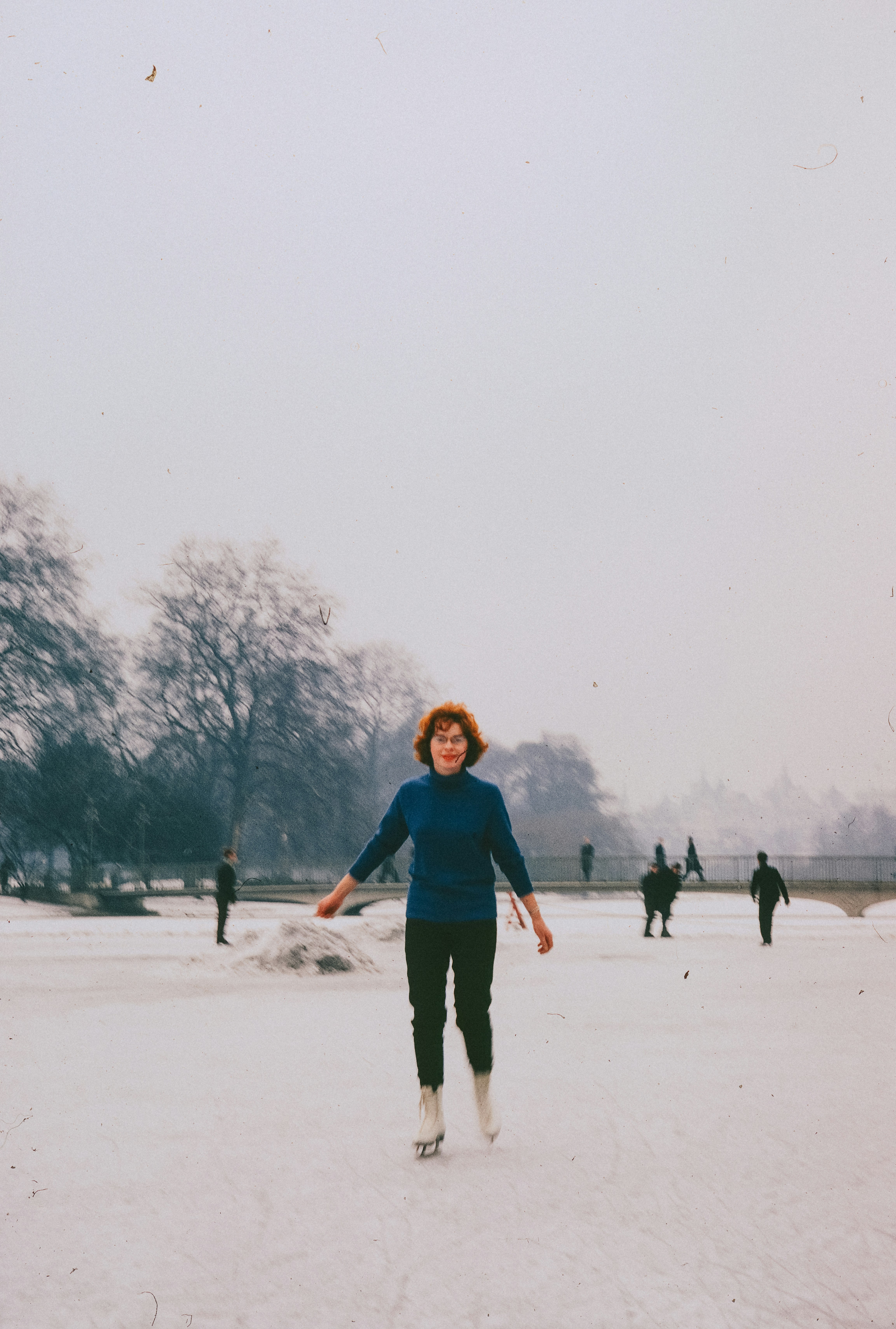 Crimson-Haired Skater on a Quiet Winter Rink