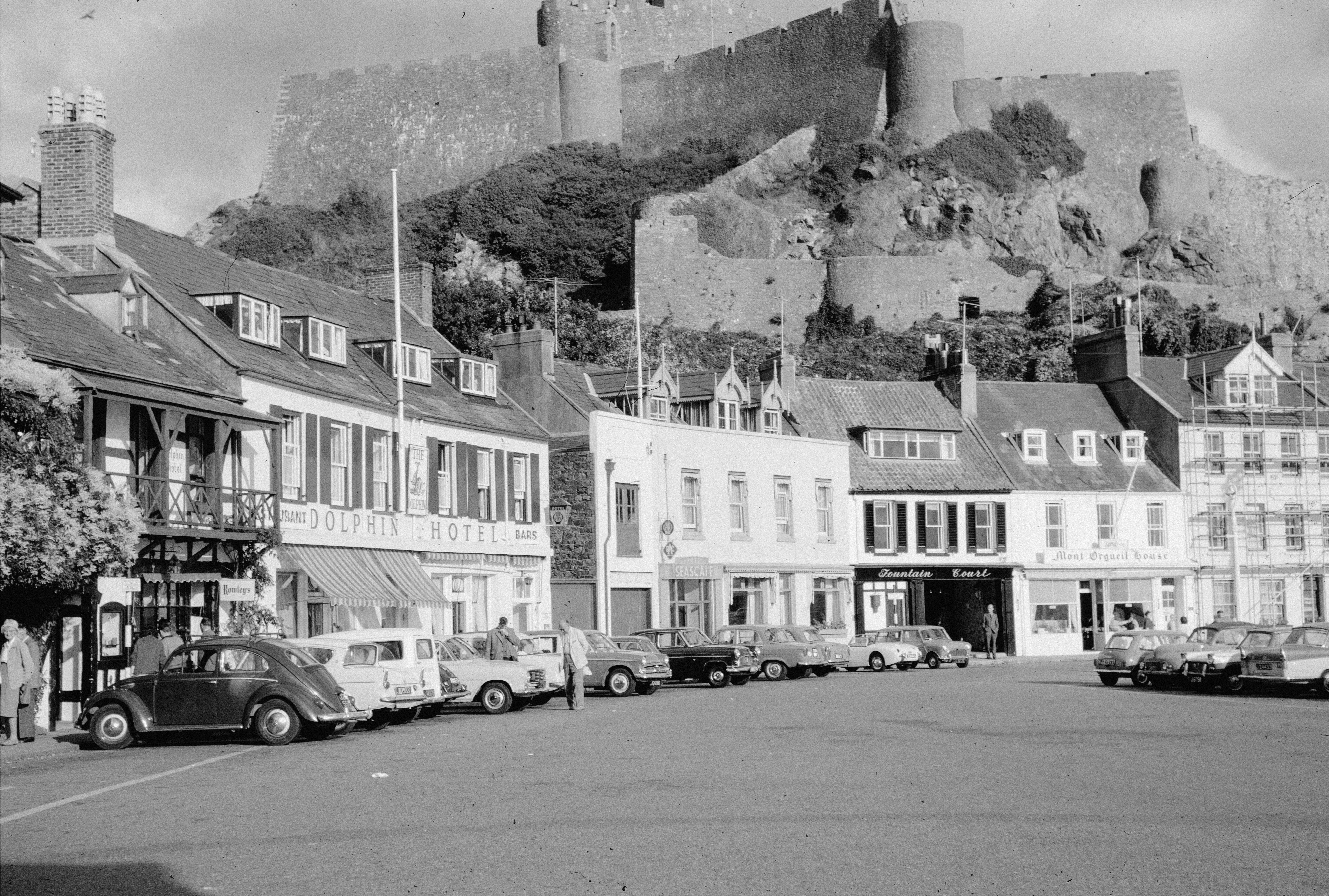 Castle Overwatch: A Quiet Seaside High Street Beneath a Hilltop Citadel