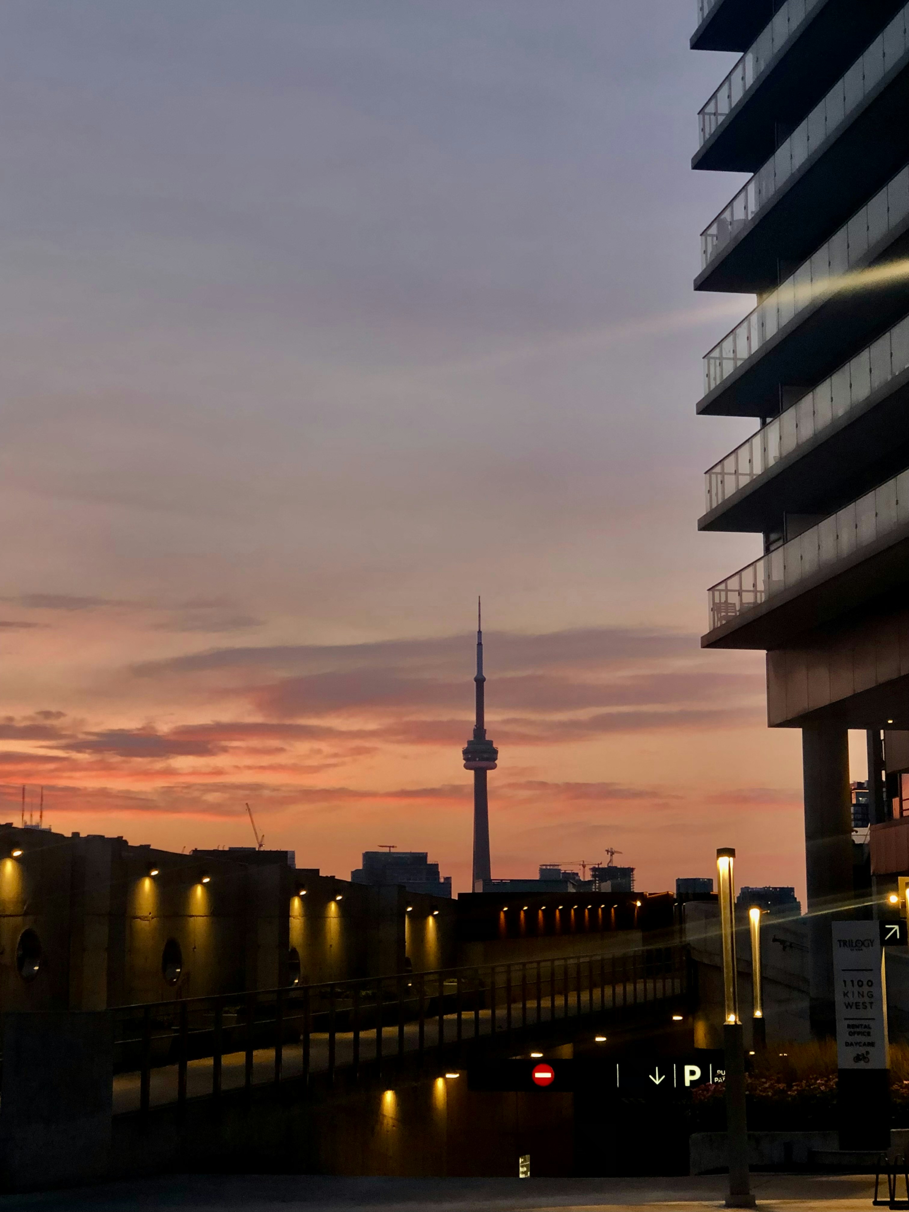 Beacon at Dusk: CN Tower Framed by a Modern Skyline