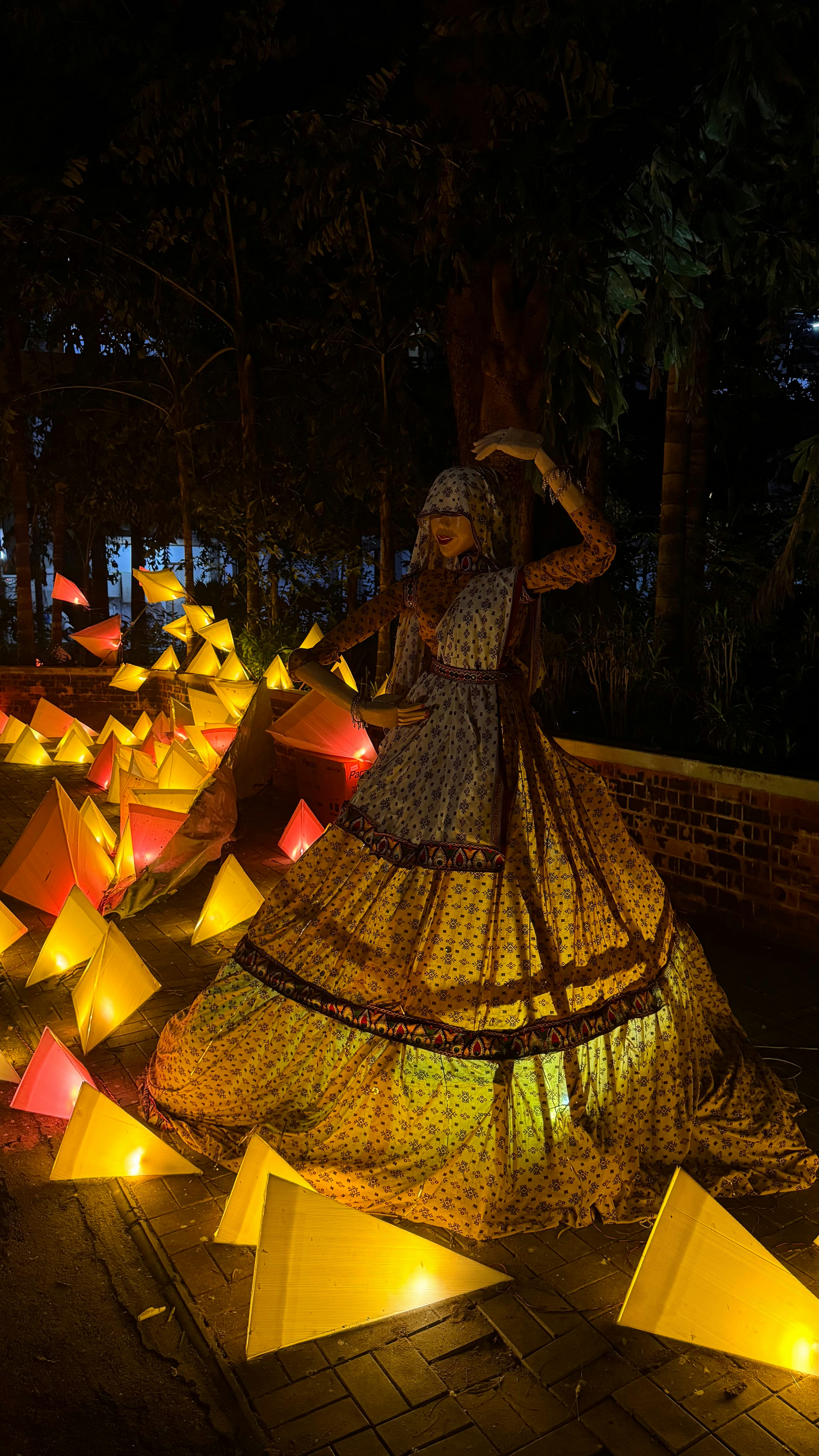 Lantern Garden Waltz: A Dancer Among Glowing Triangles