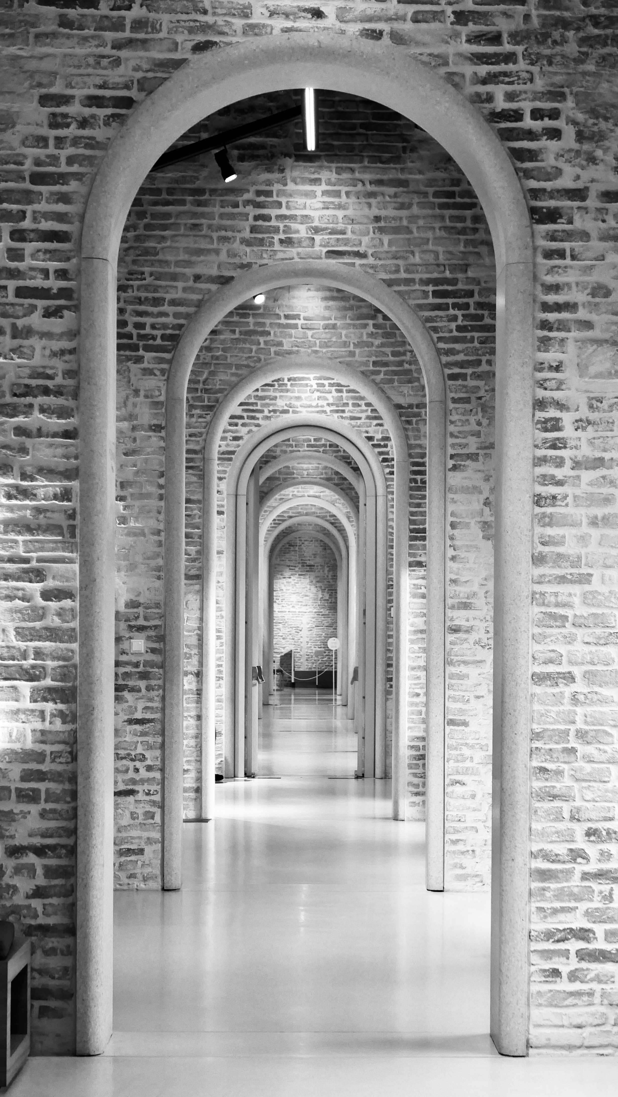 Monochrome Arcade: Receding Brick Archways