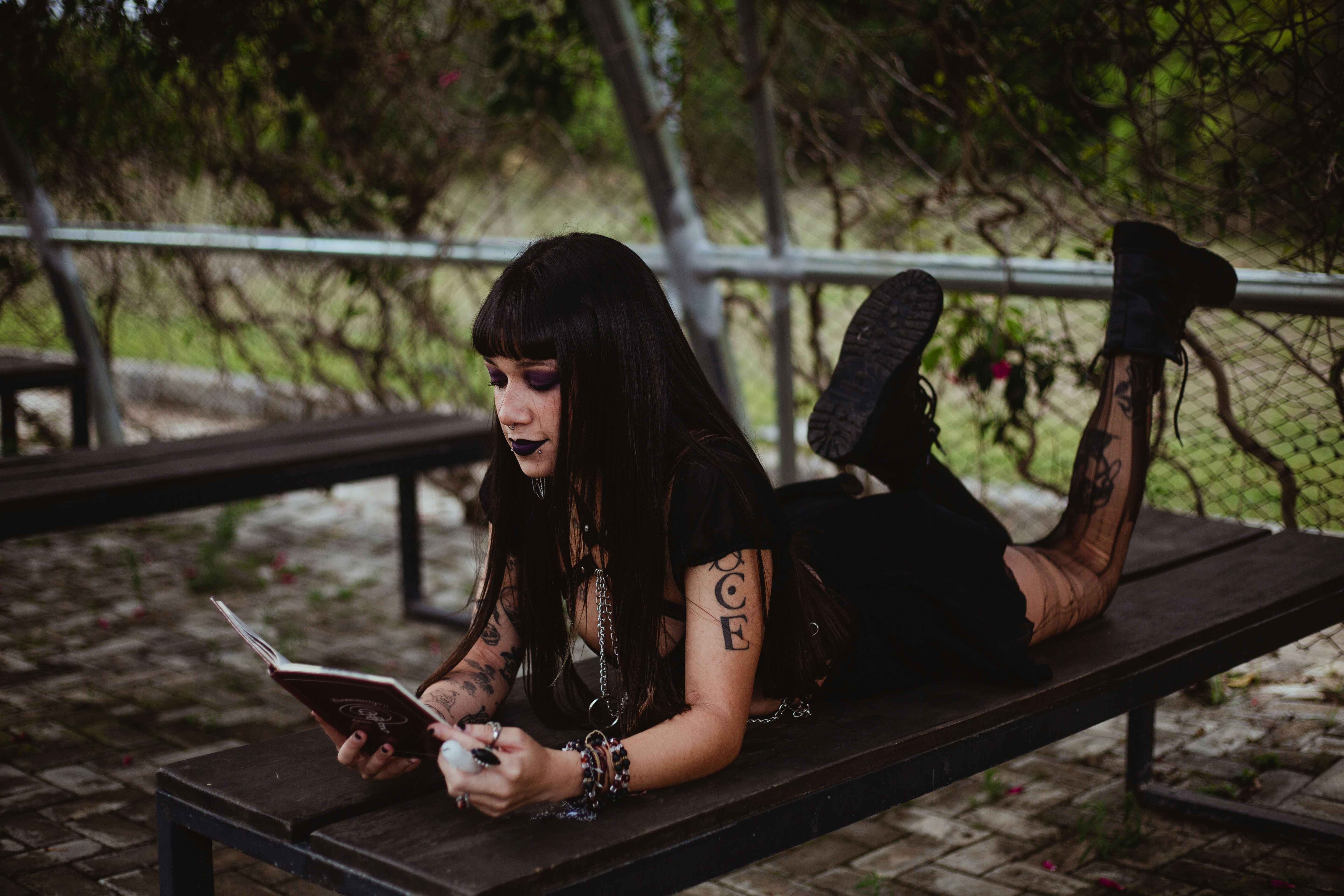 Gothic Reverie on a Park Bench: Inked Quiet in Dappled Light