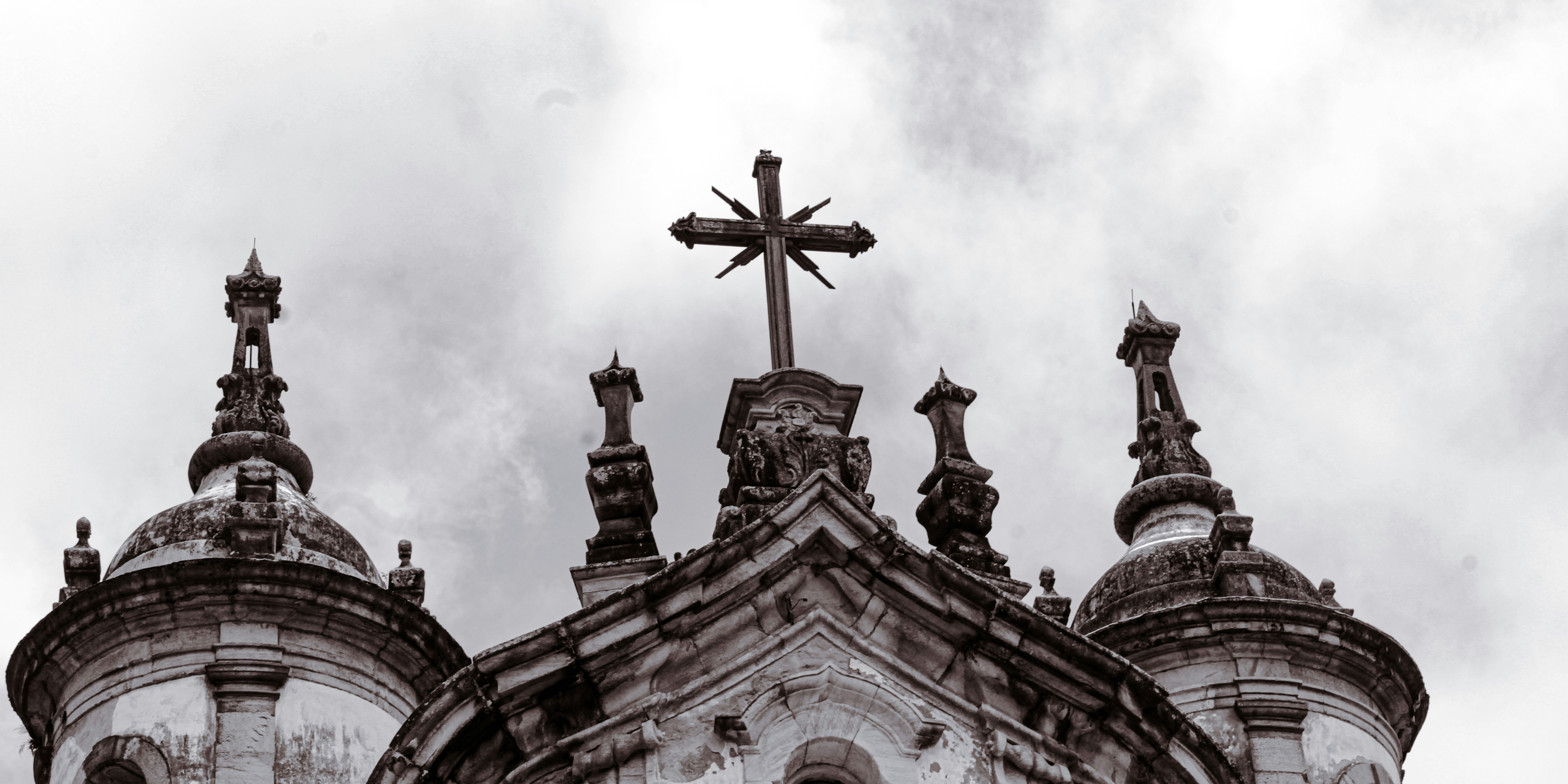 Monochrome Cathedral Crown: The Central Cross Among Ornate Spires