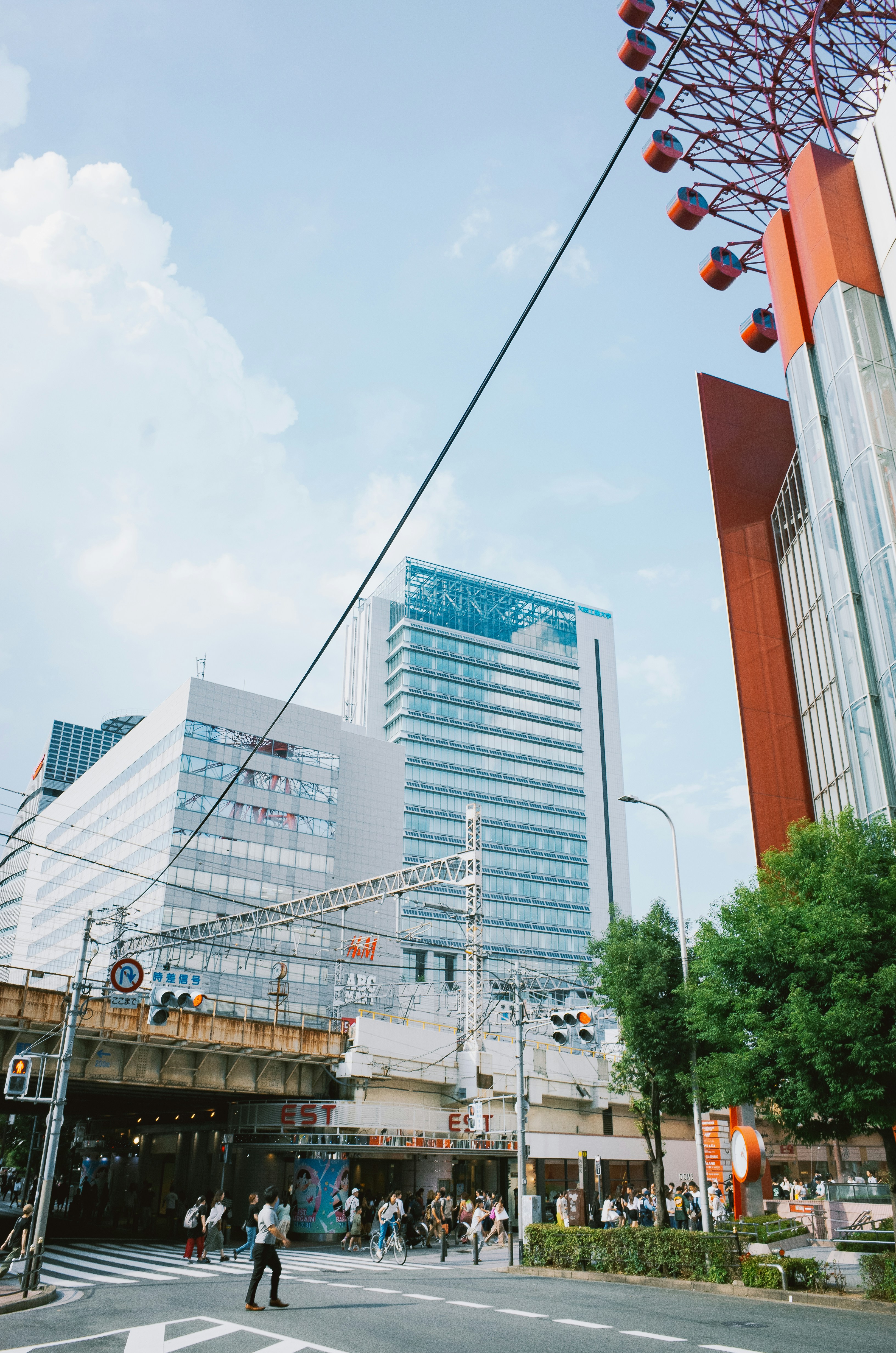 Crossroads of Glass Towers and Overhead Rails