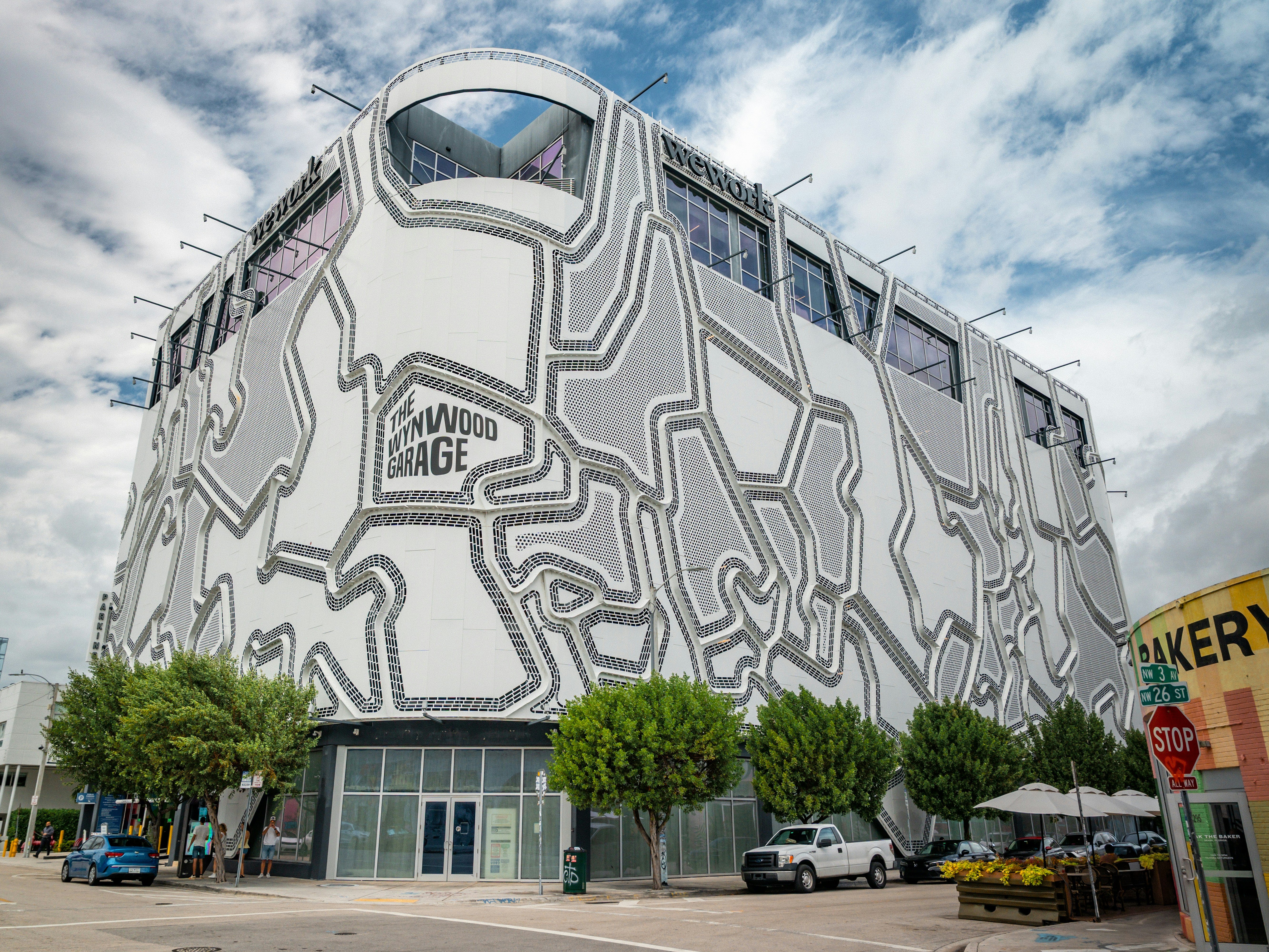Linwood Garage: White Facade Woven Like Circuitry