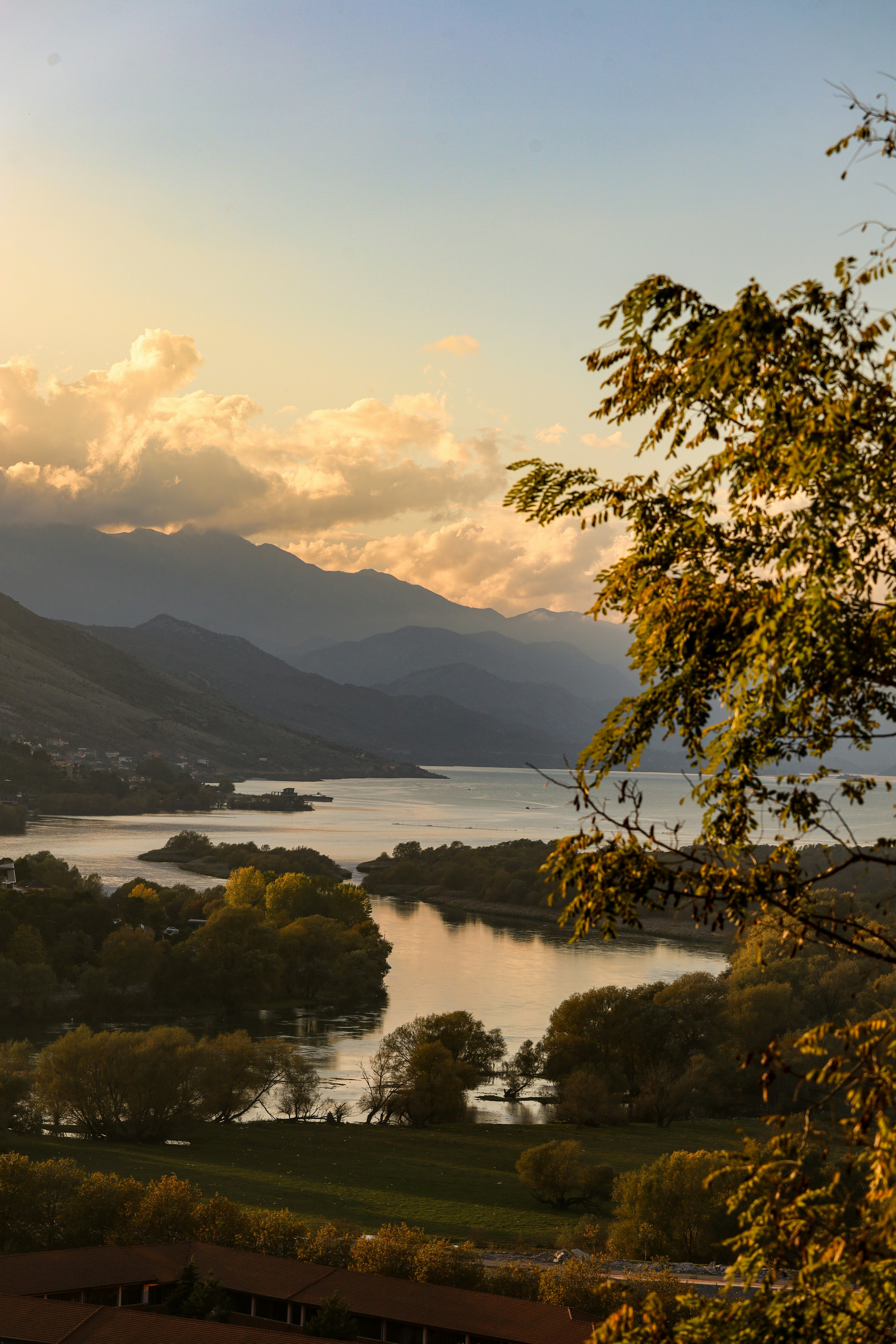 Valley of Golden Light: A River Meanders Beneath Sunset Peaks