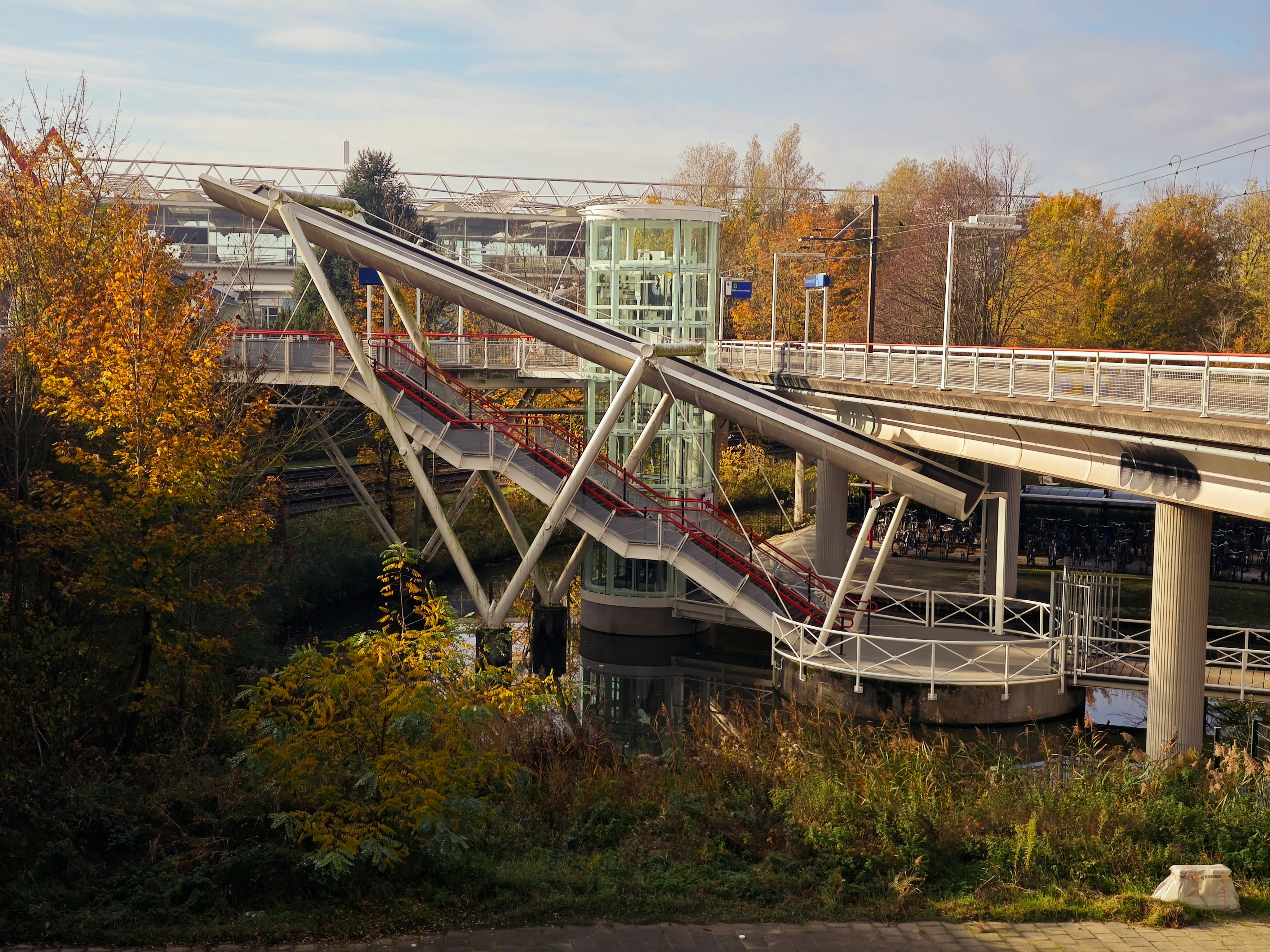 Modern pedestrian bridge with stairs and elevator