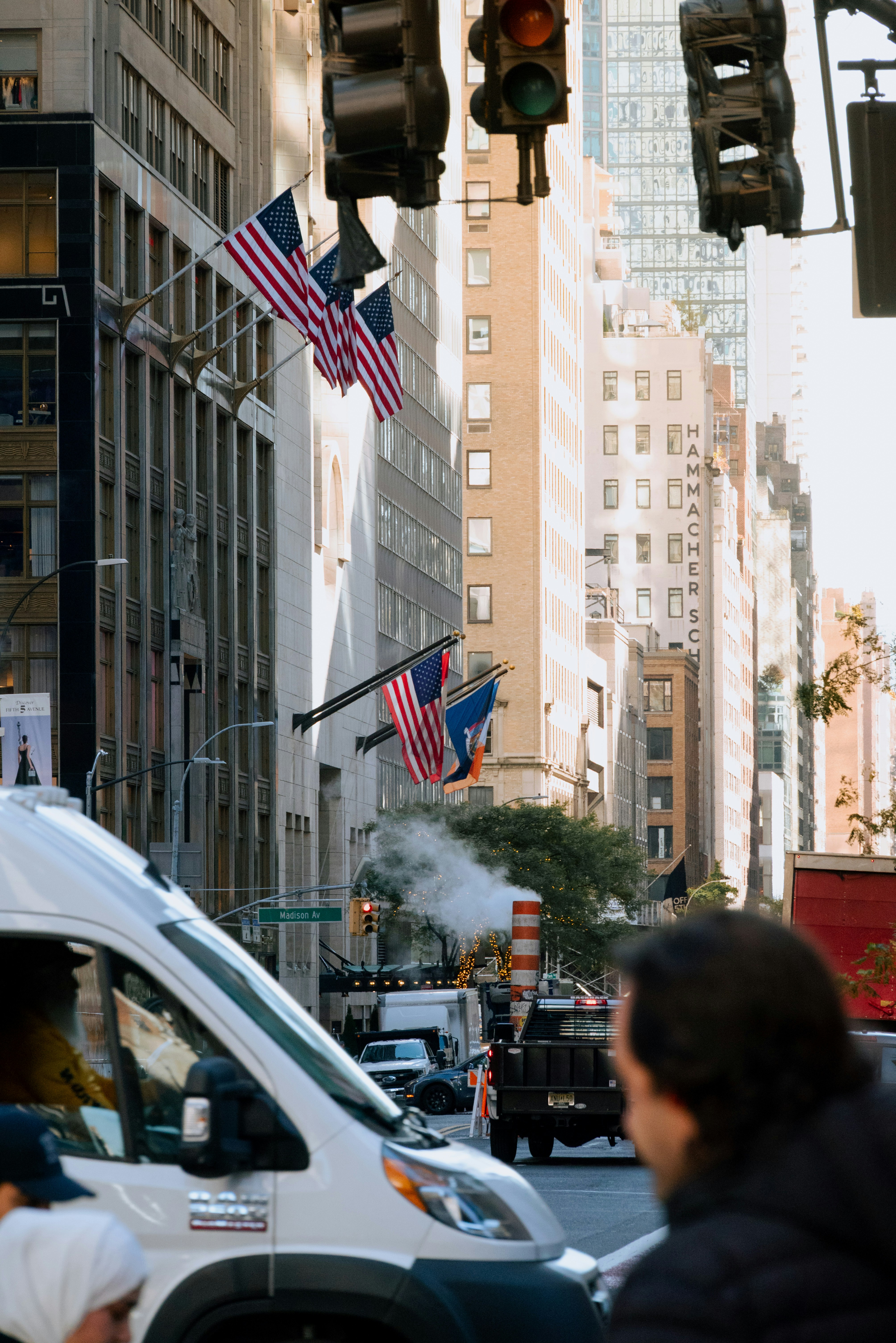 Flags, Steam, and City Motion: A Downtown Street Snapshot