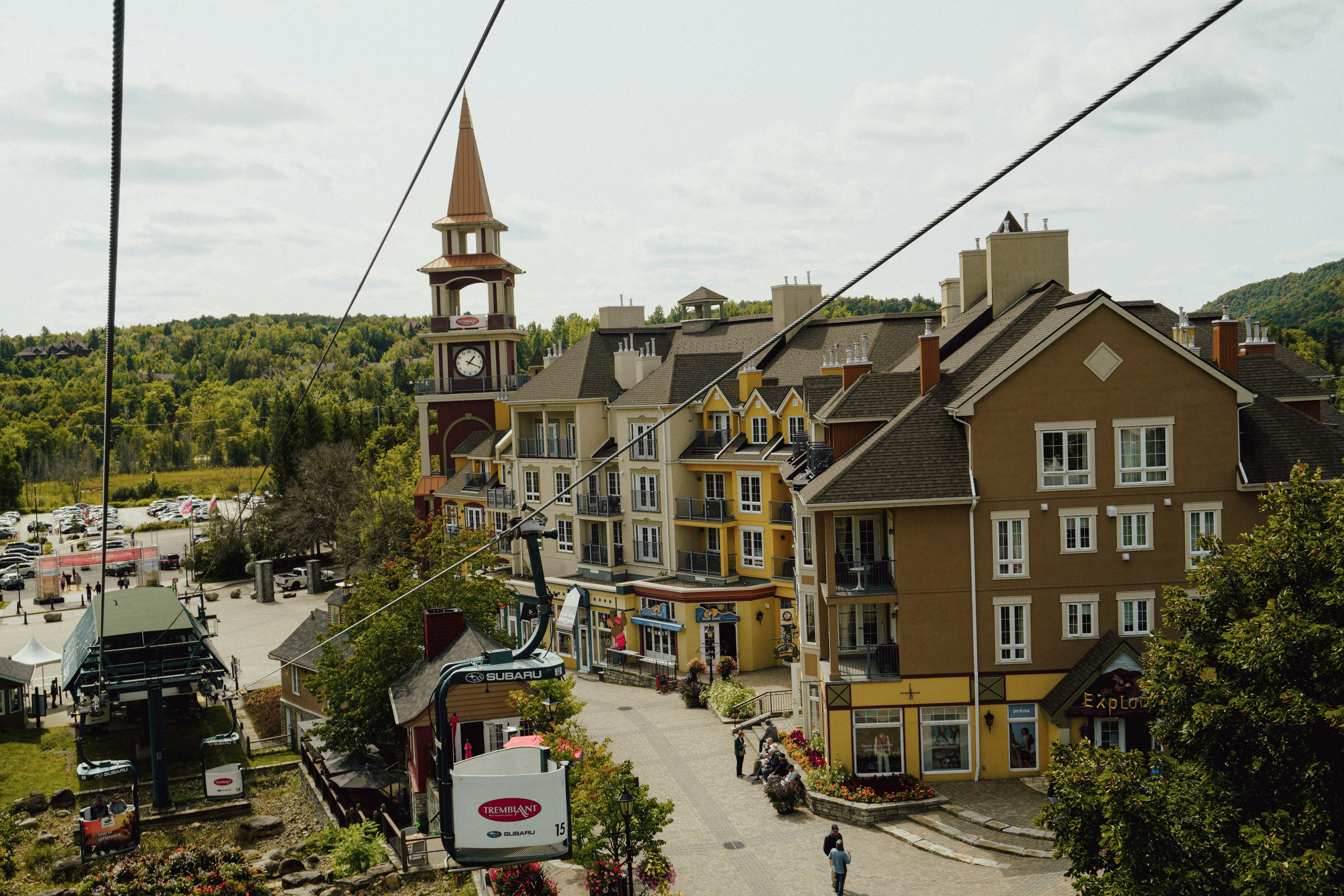 Clock Tower Promenade: Colorful Alpine Village on a Sunlit Street