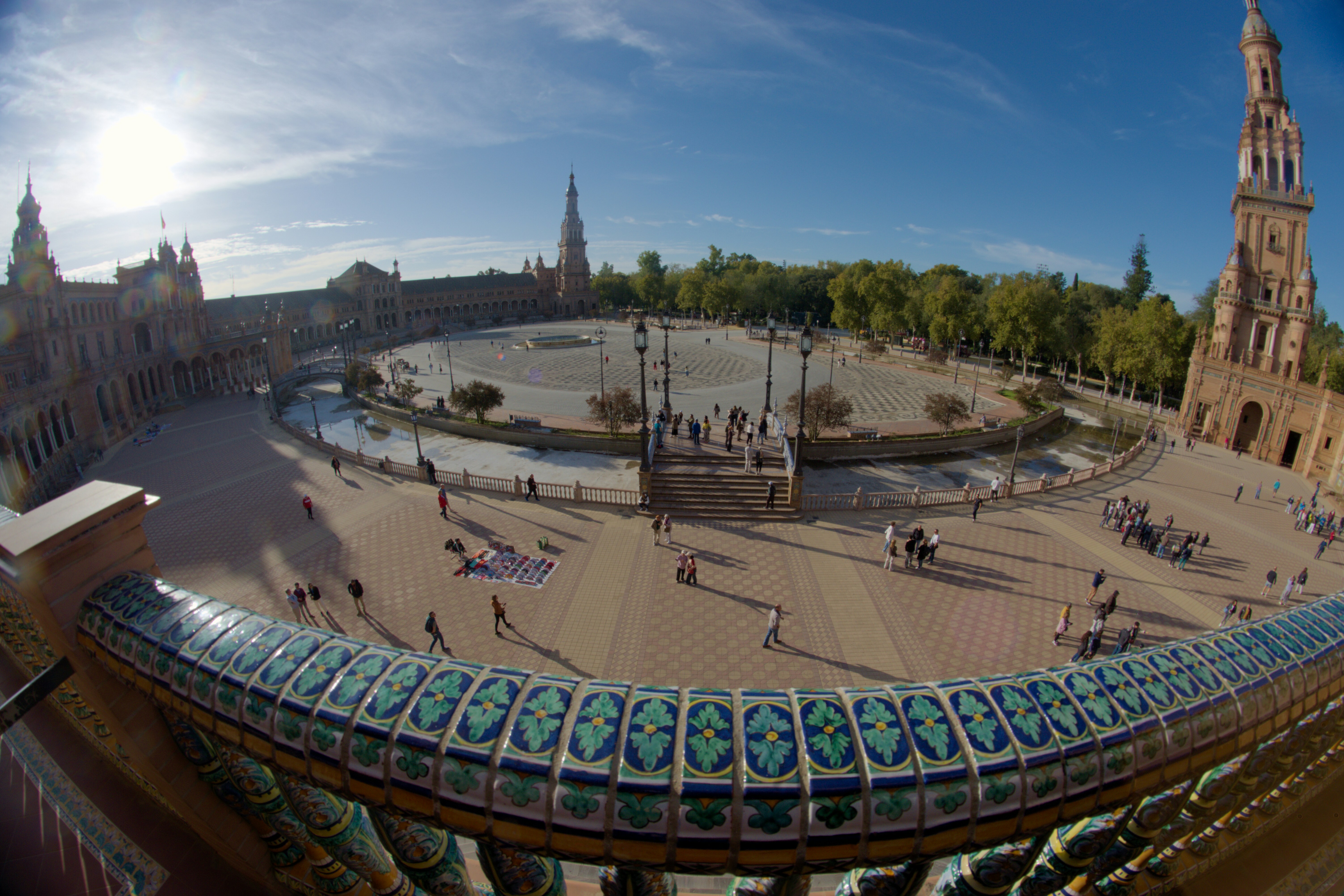 Seville's Circular Canvas: A Sunlit Fish-Eye Tour of Plaza de España