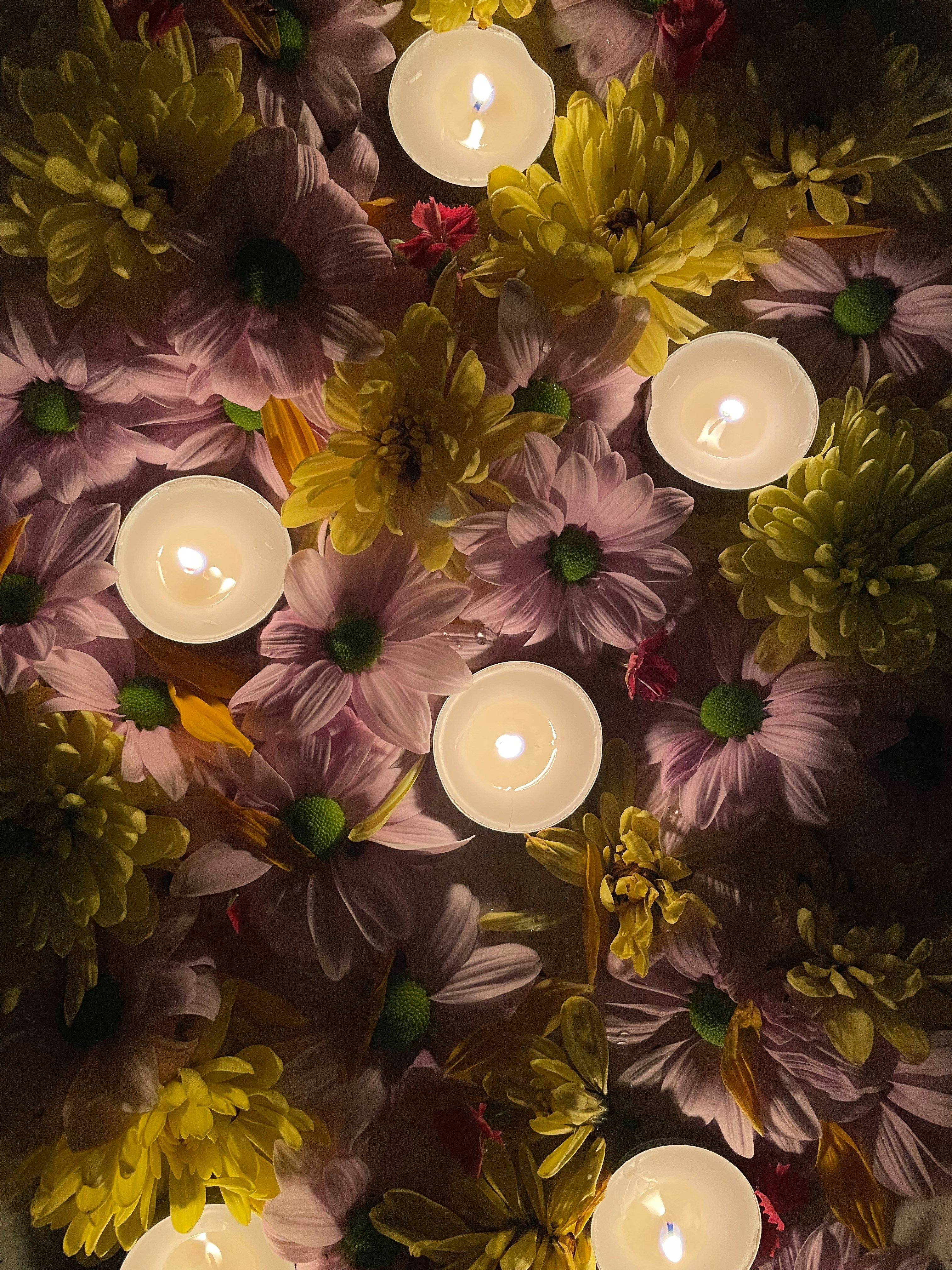 Tealight Mosaic: Petals Bathed in Candlelit Warmth