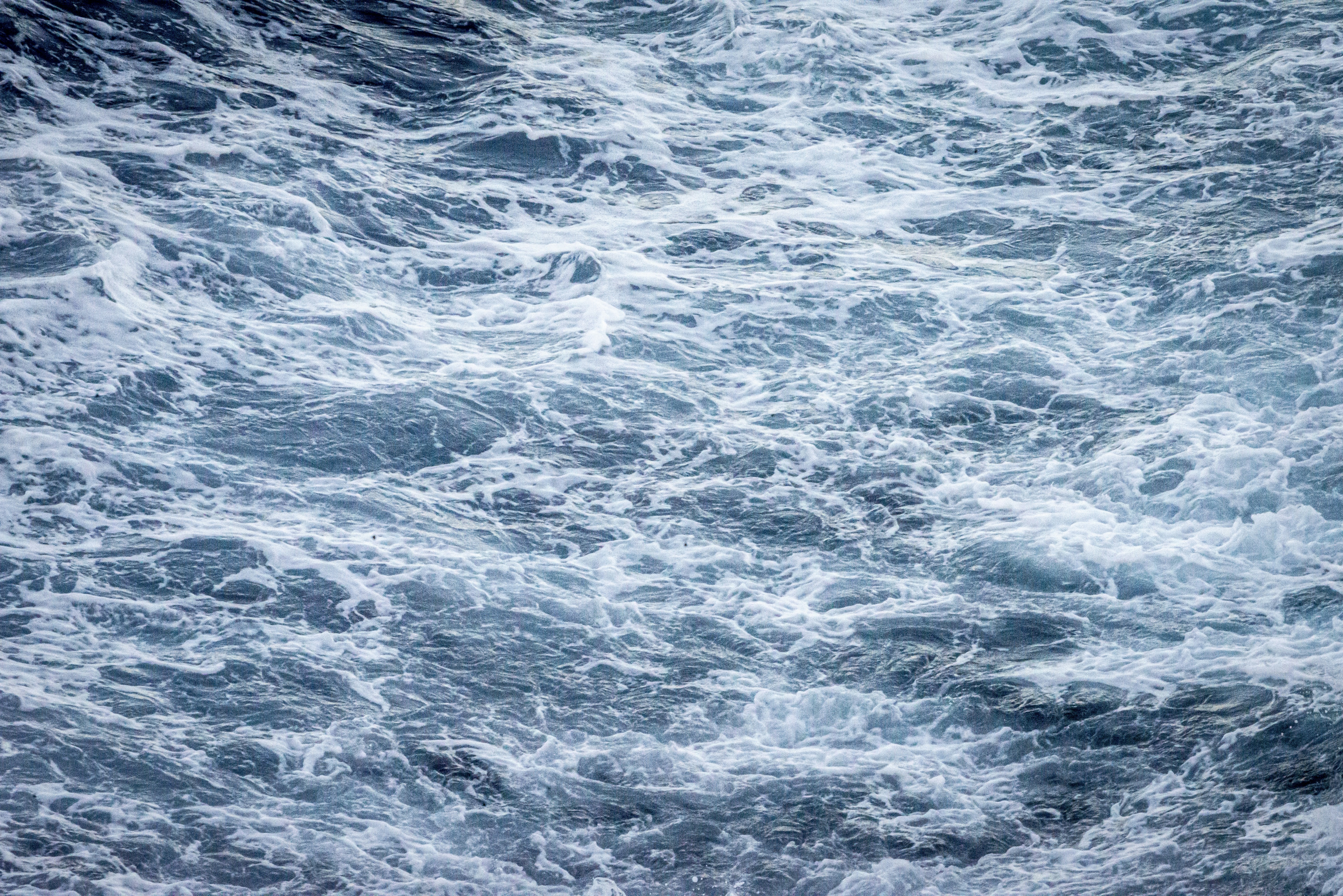 Churning blue ocean water with white foam photo – Free Travel Image on ...