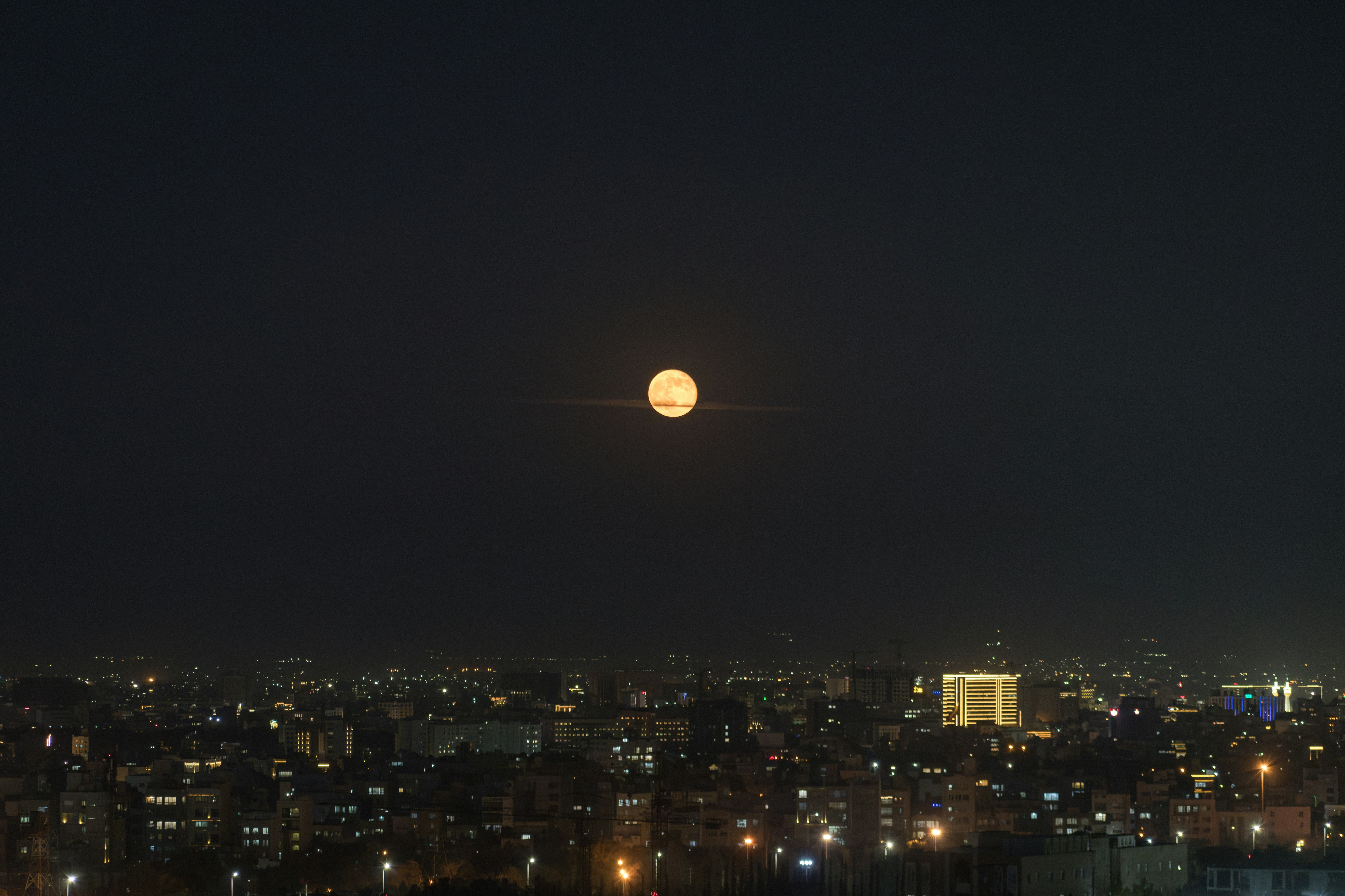 Moonrise Over the City: A Quiet Nightscape
