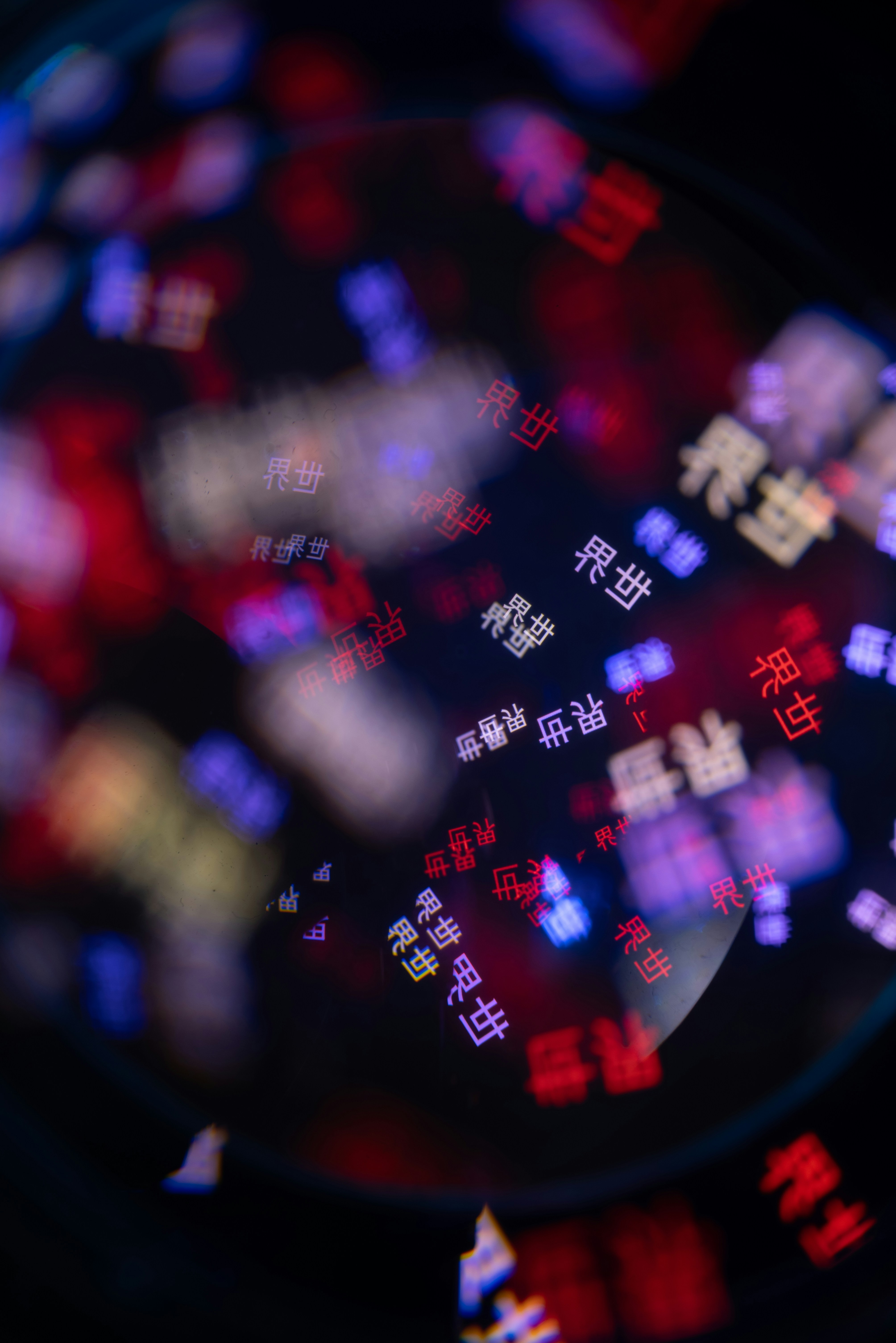 Neon Glyphs Glowing in a Defocused Lens