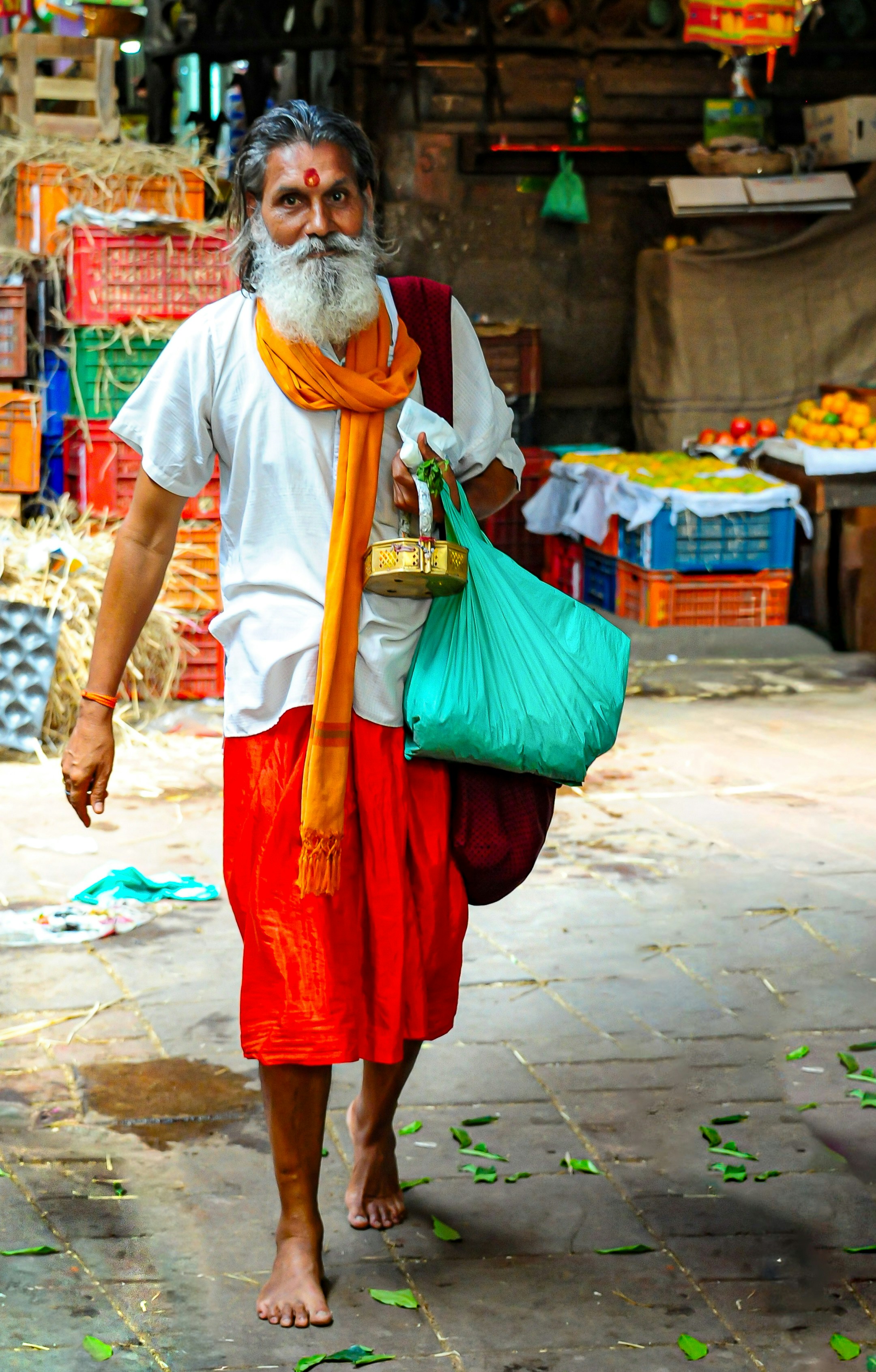 Bearded Vendor in a Color-Splashed Market