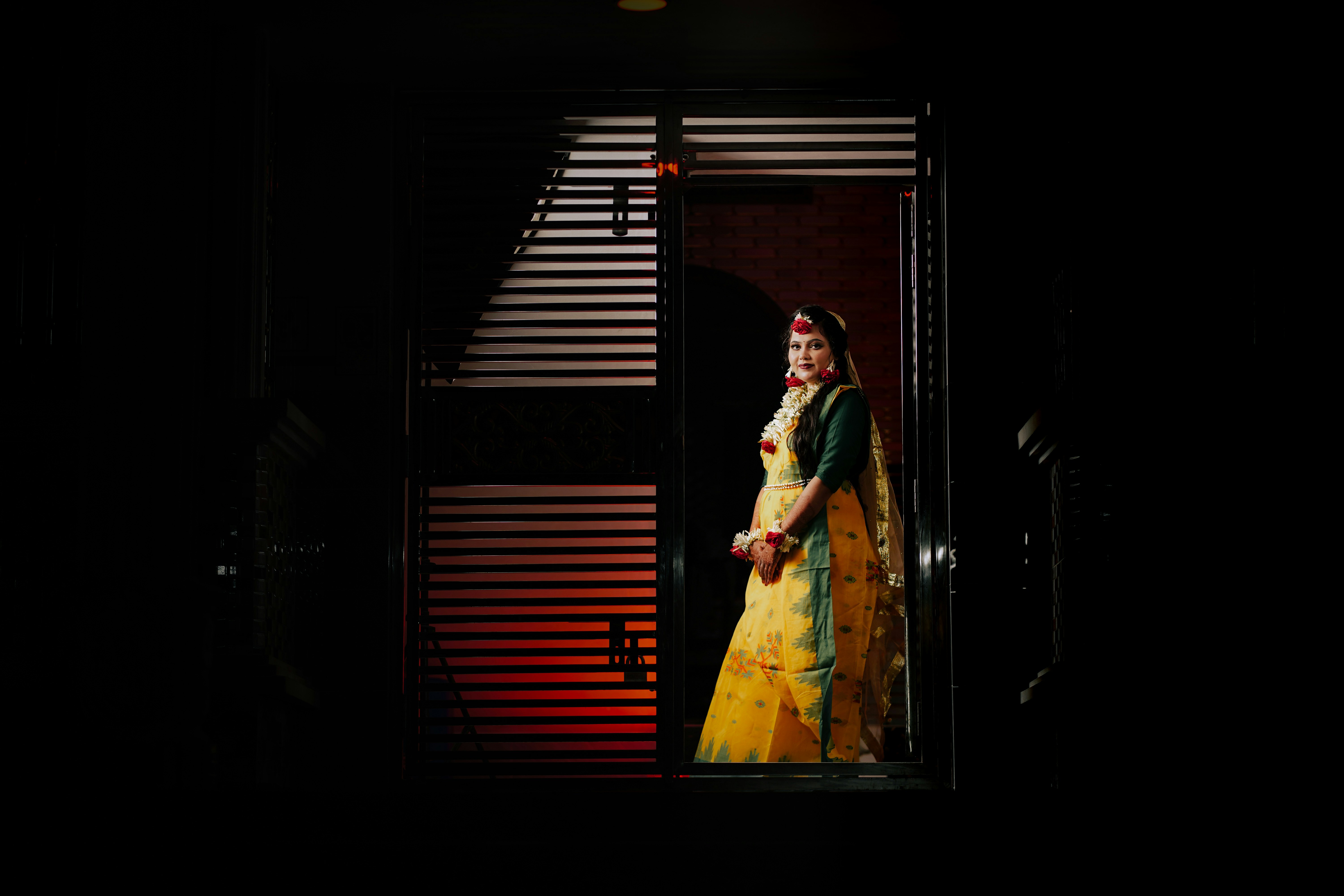 Ember Gateway: Yellow Saree in a Shadowed Corridor