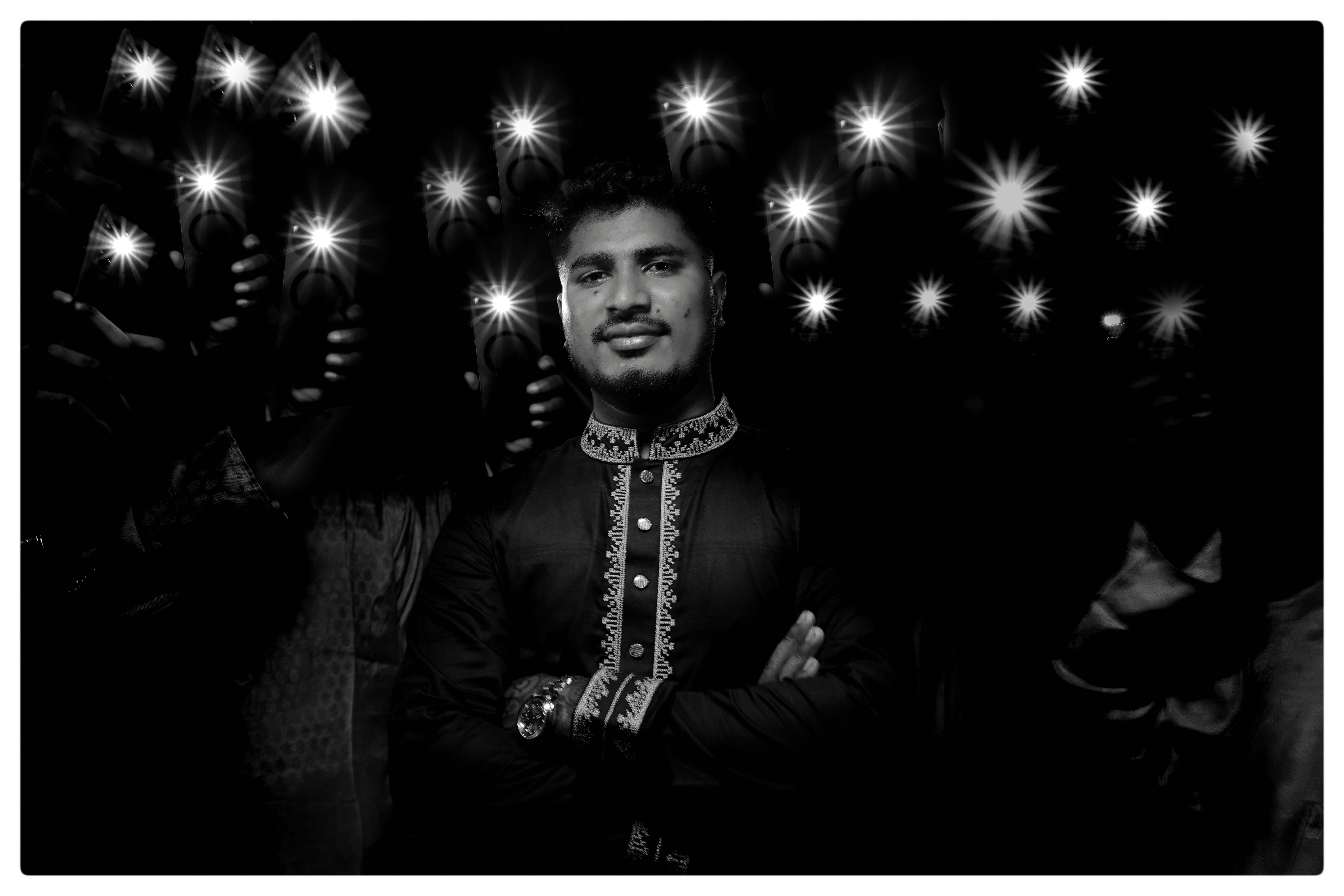 Center Portrait Amidst Sparks: A Night of Quiet Celebration