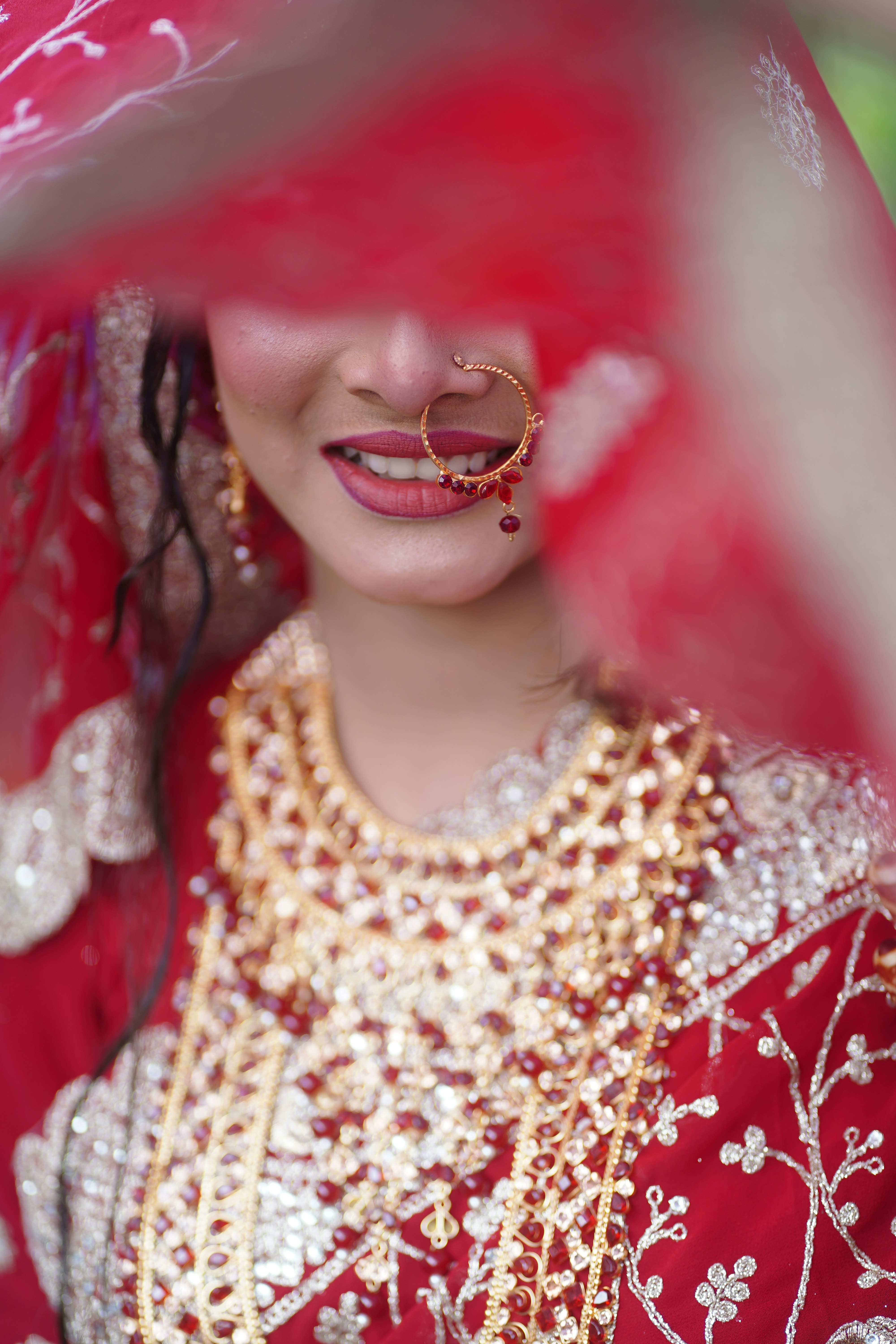 Bride in red attire with traditional indian jewelry. photo – Free ...