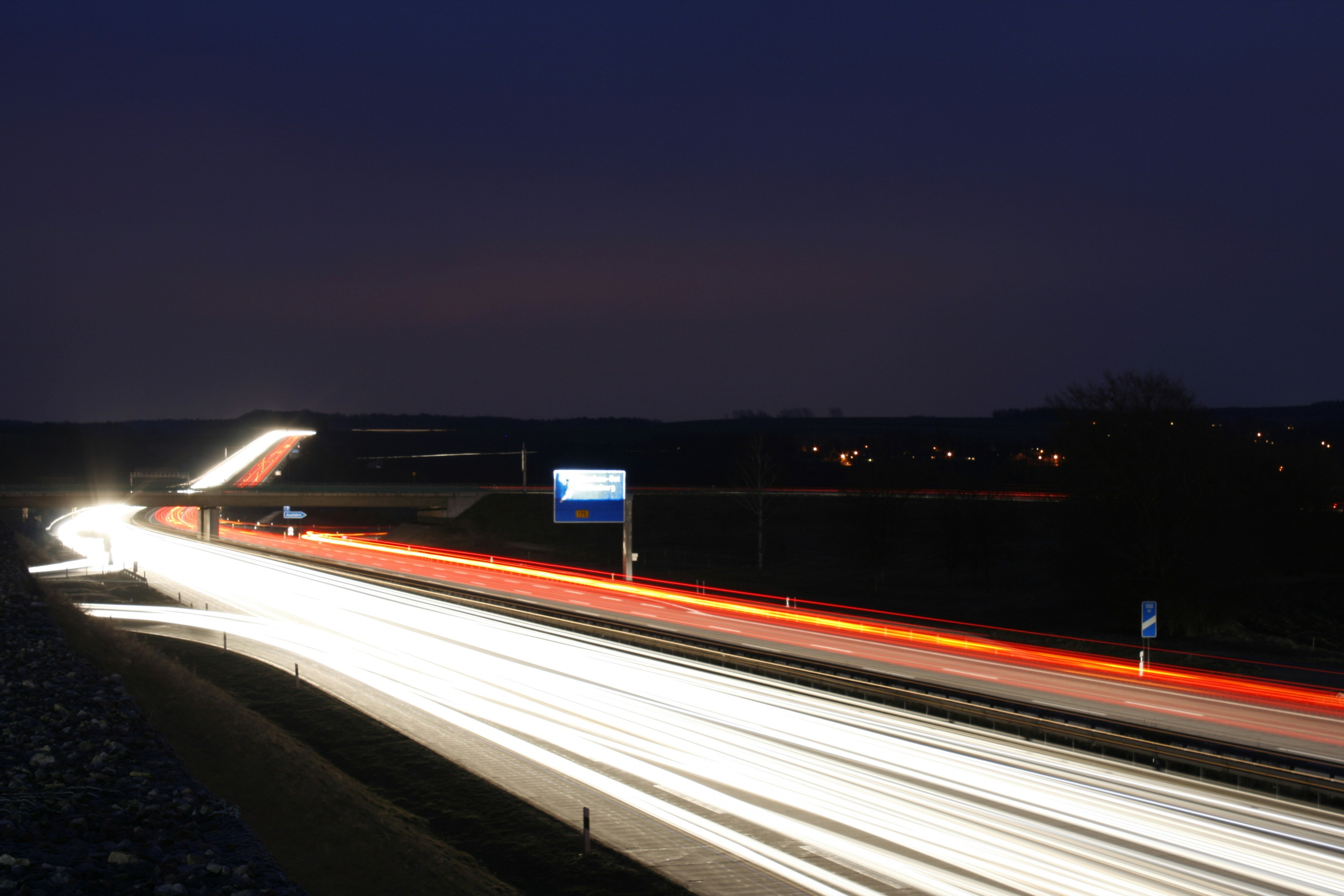 Velvet Night Ribbons on the Highway: A Long-Exposure Study