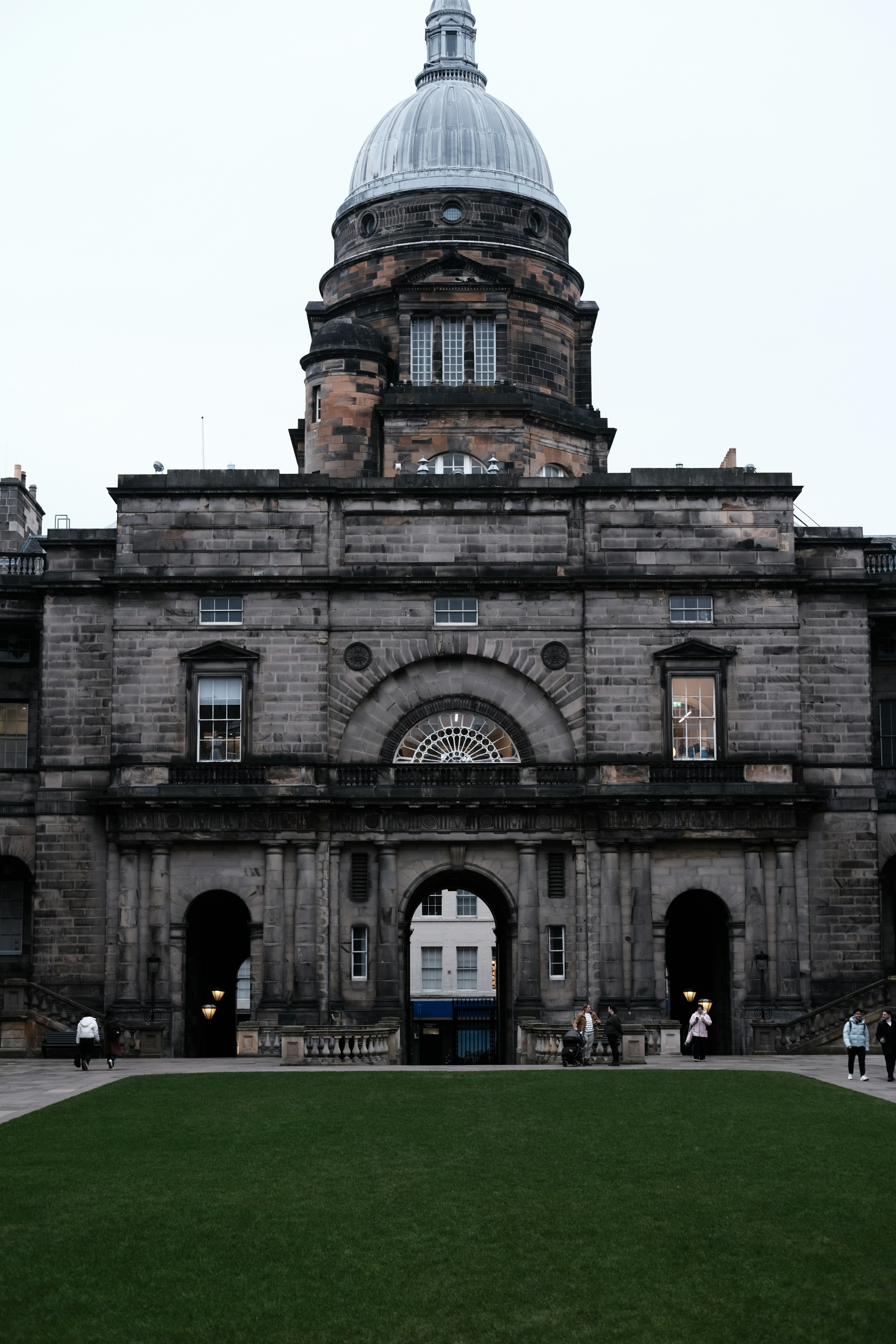 Stone Gatekeeper: Central Arch Beneath a Domed Pavilion