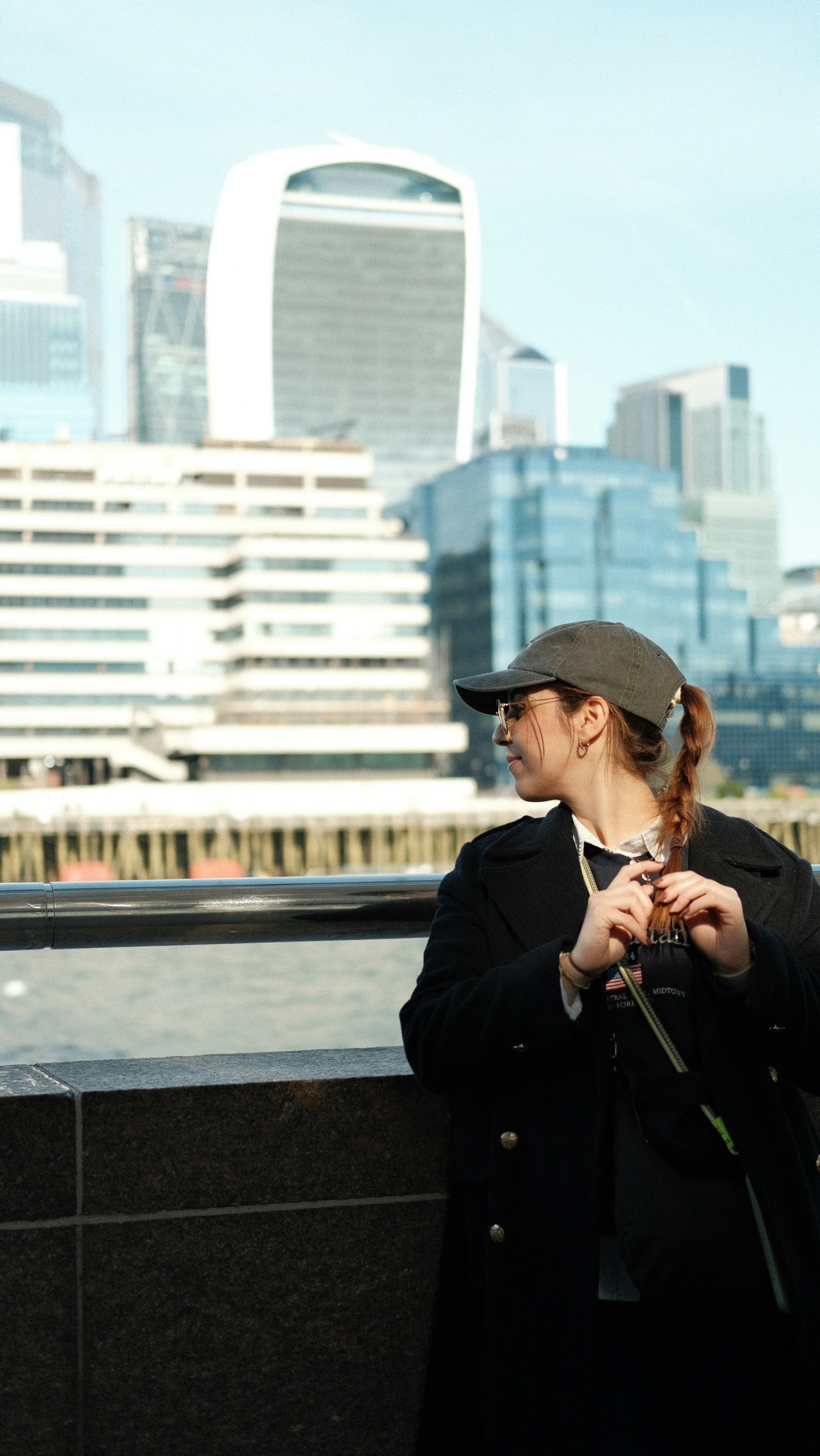 Thameslight Portrait: A Candid Moment Under the Walkie-Talkie Skyline