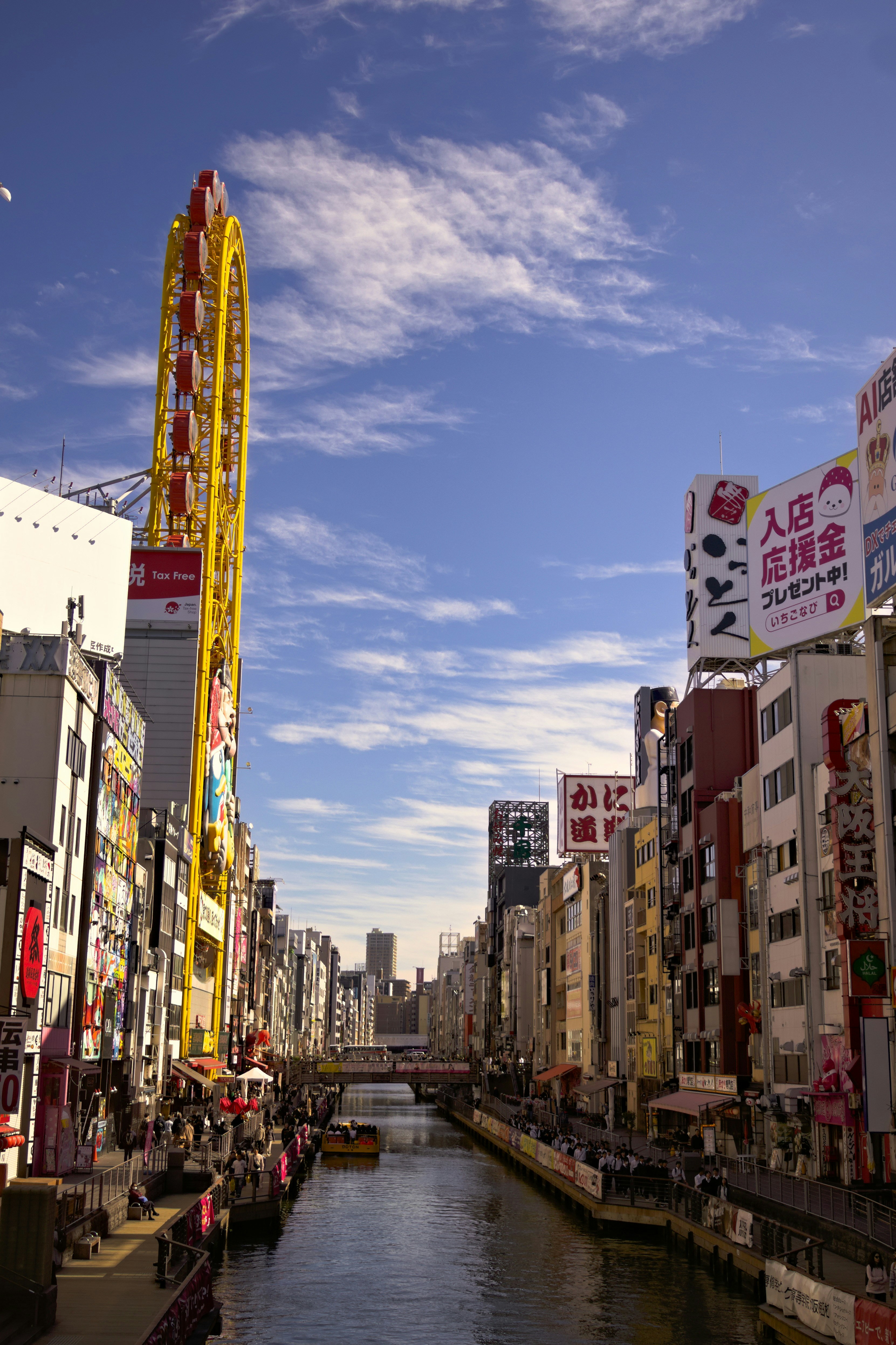 Golden Ferris Wheel Framing Osaka's Neon Canal