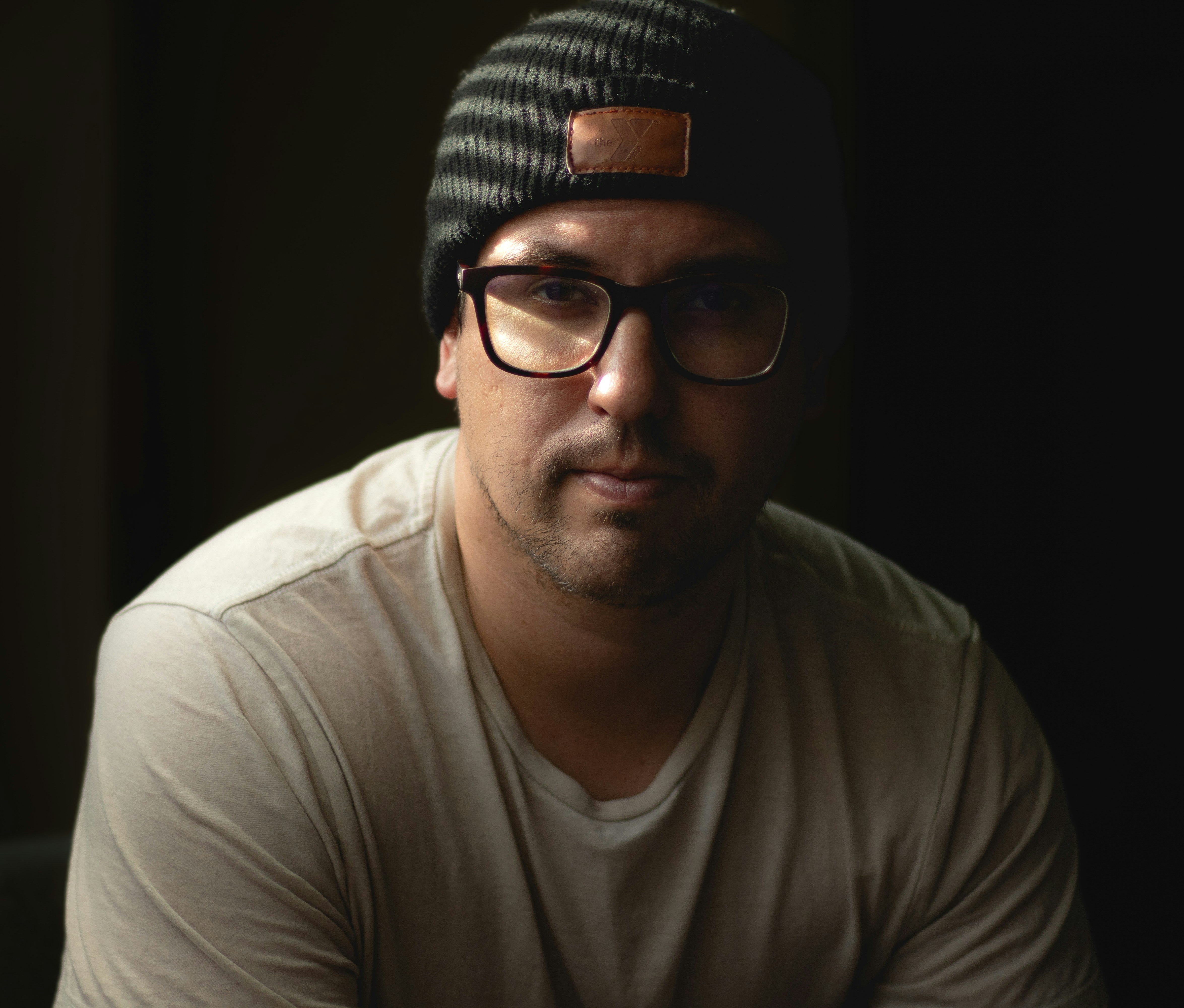 Side-Lit Focus: A Contemplative Portrait in Quiet Shadows