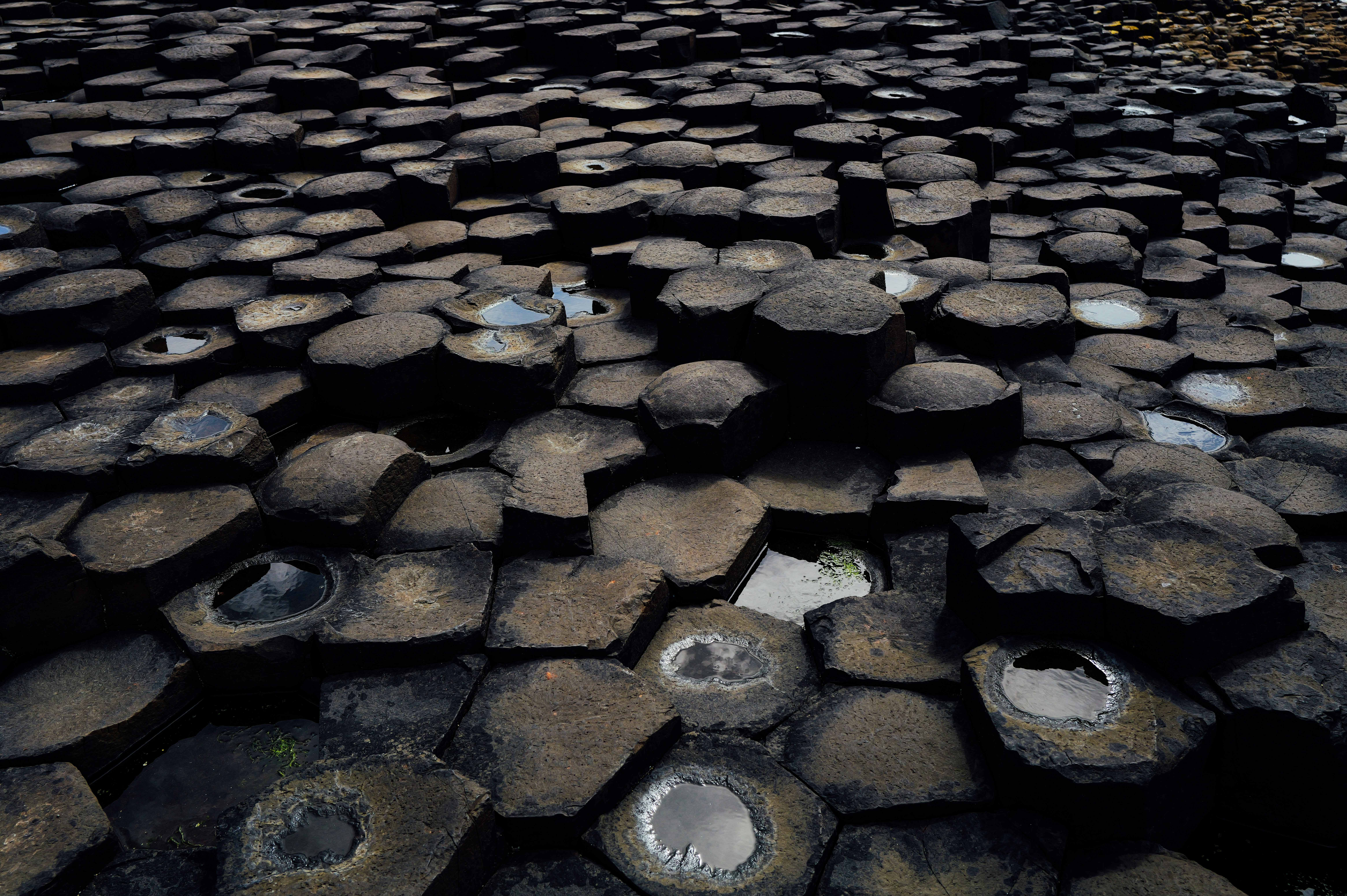 Hexagonal basalt columns form a natural pavement photo – Free Stone ...