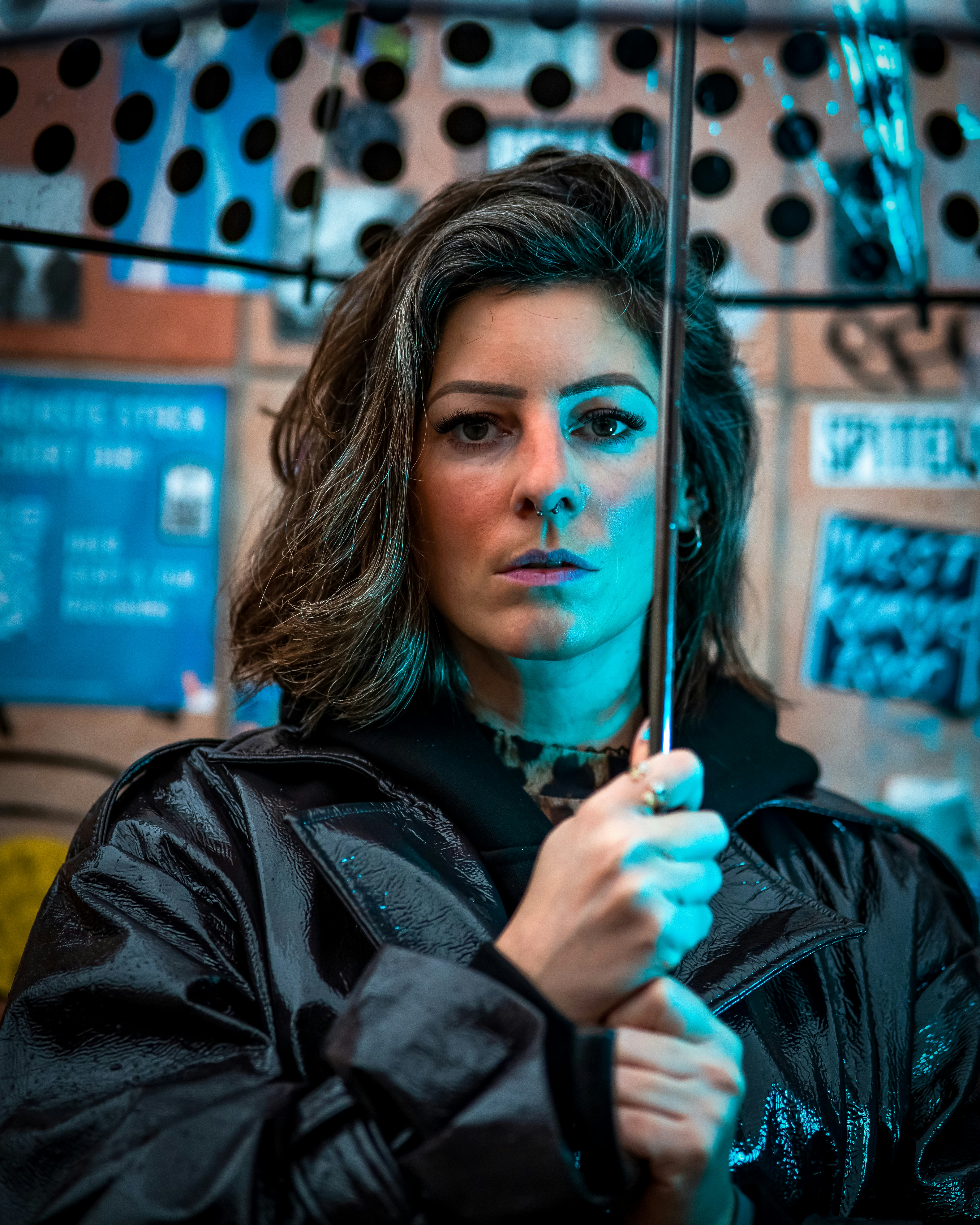 Neon-Cobalt Gaze: A Rain-Kissed Portrait Under Blue Street Light