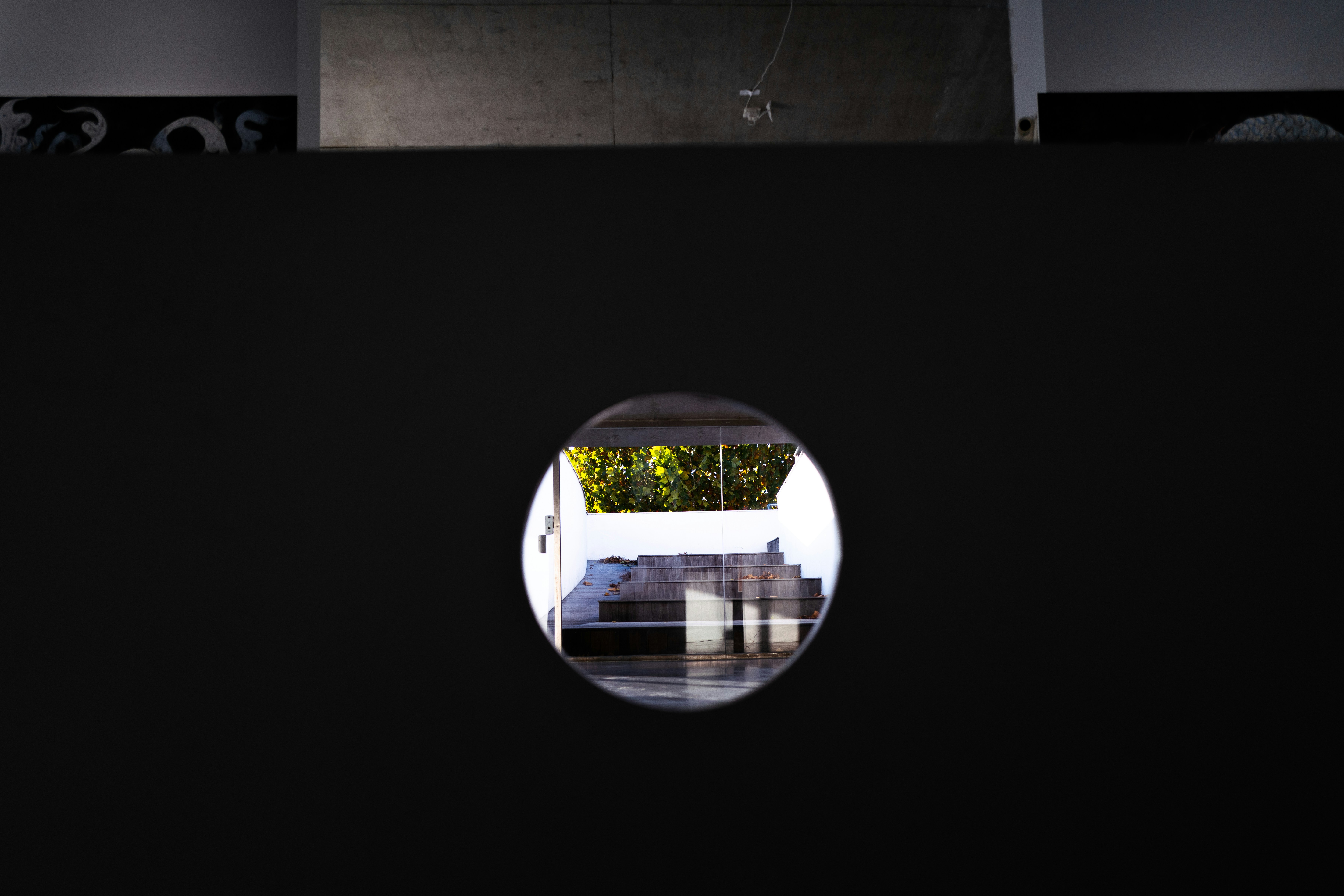 Oculus of Light: A Quiet Portal Beyond the Dark Wall