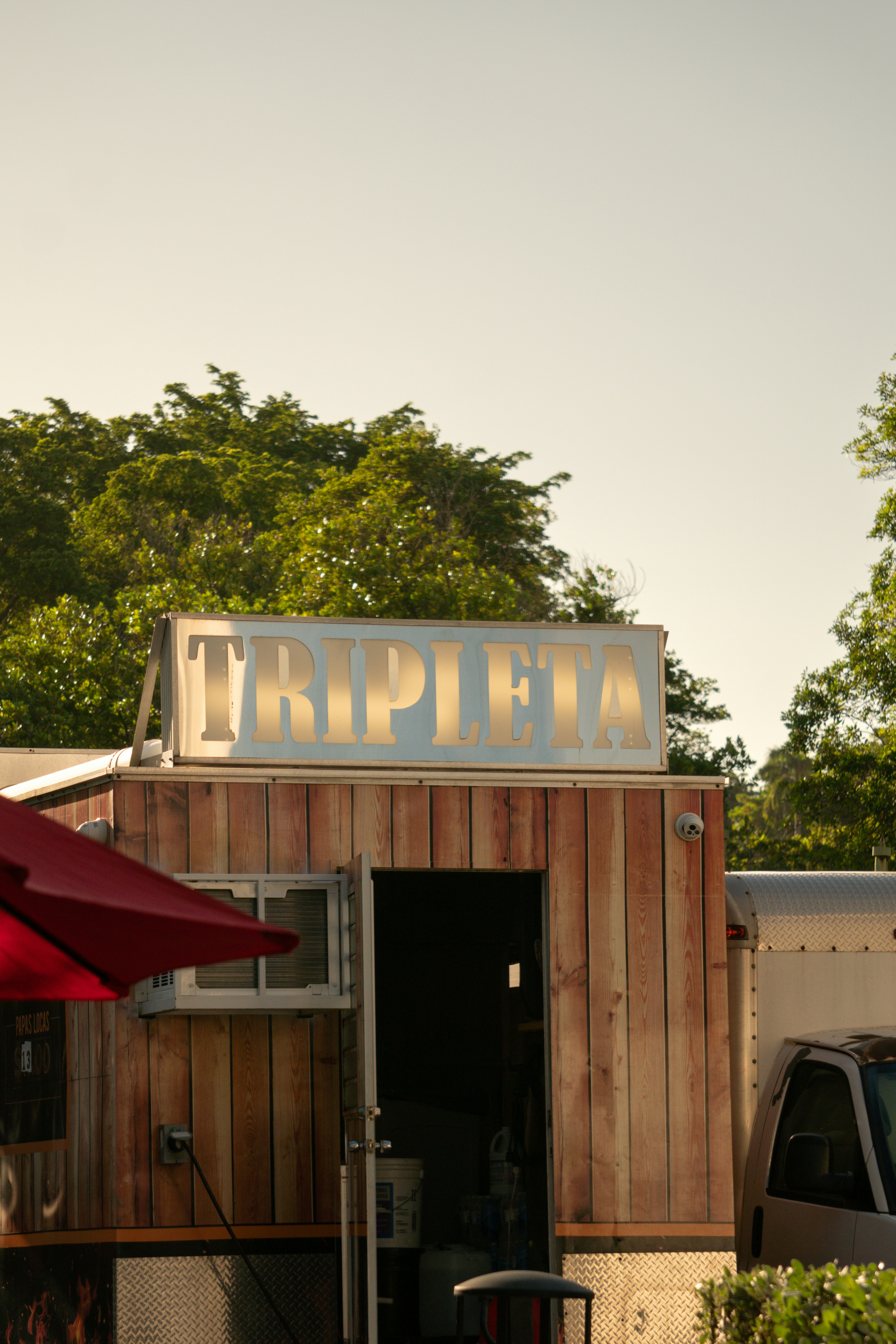 Golden Hour at TRIPLETA: A Weathered Takeout Shack Comes Alive