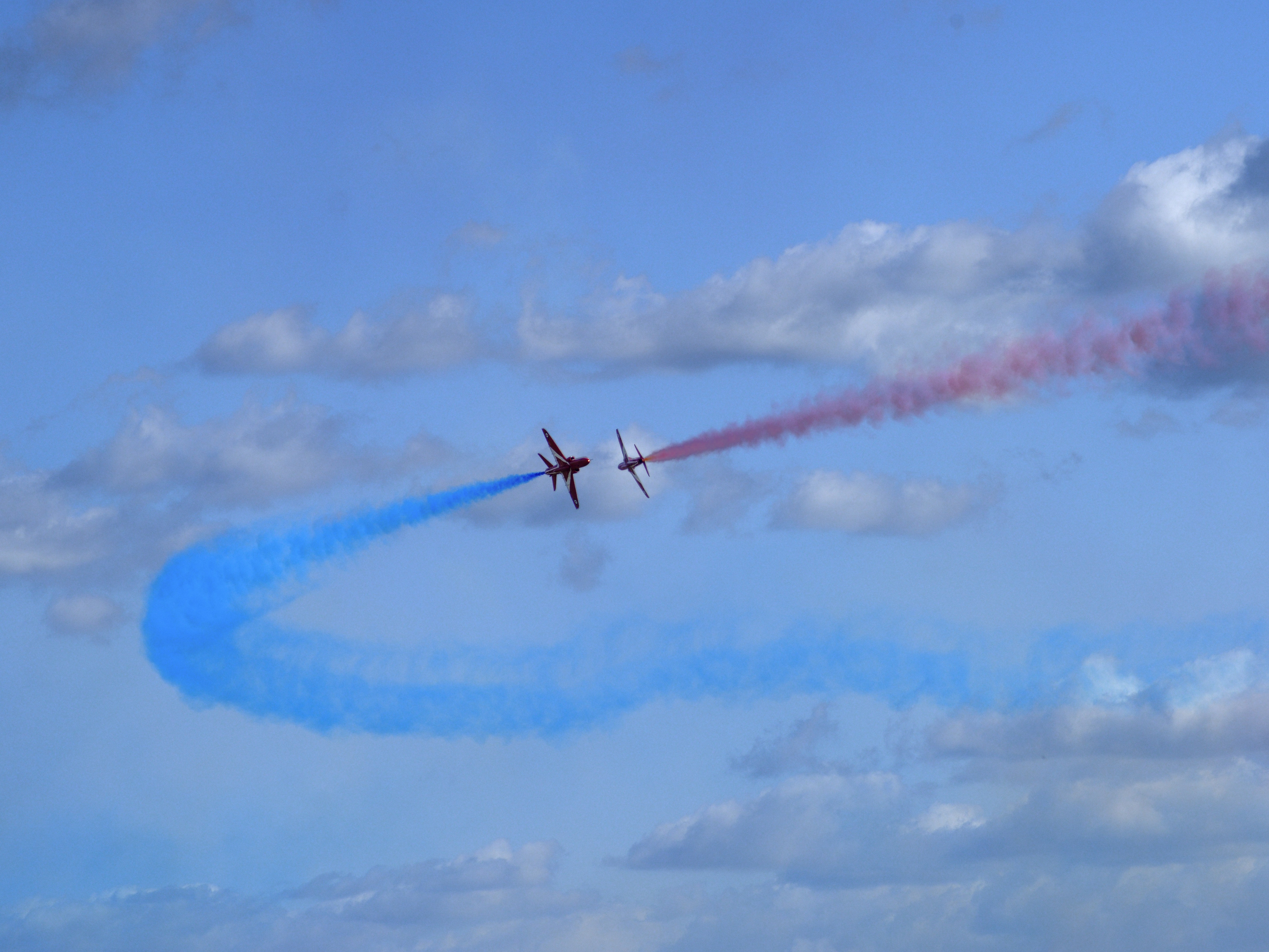 The Red Arrows, the world-famous display team of the Royal Air Force, soar over Roskilde Airport during the Roskilde Airshow 2025.
