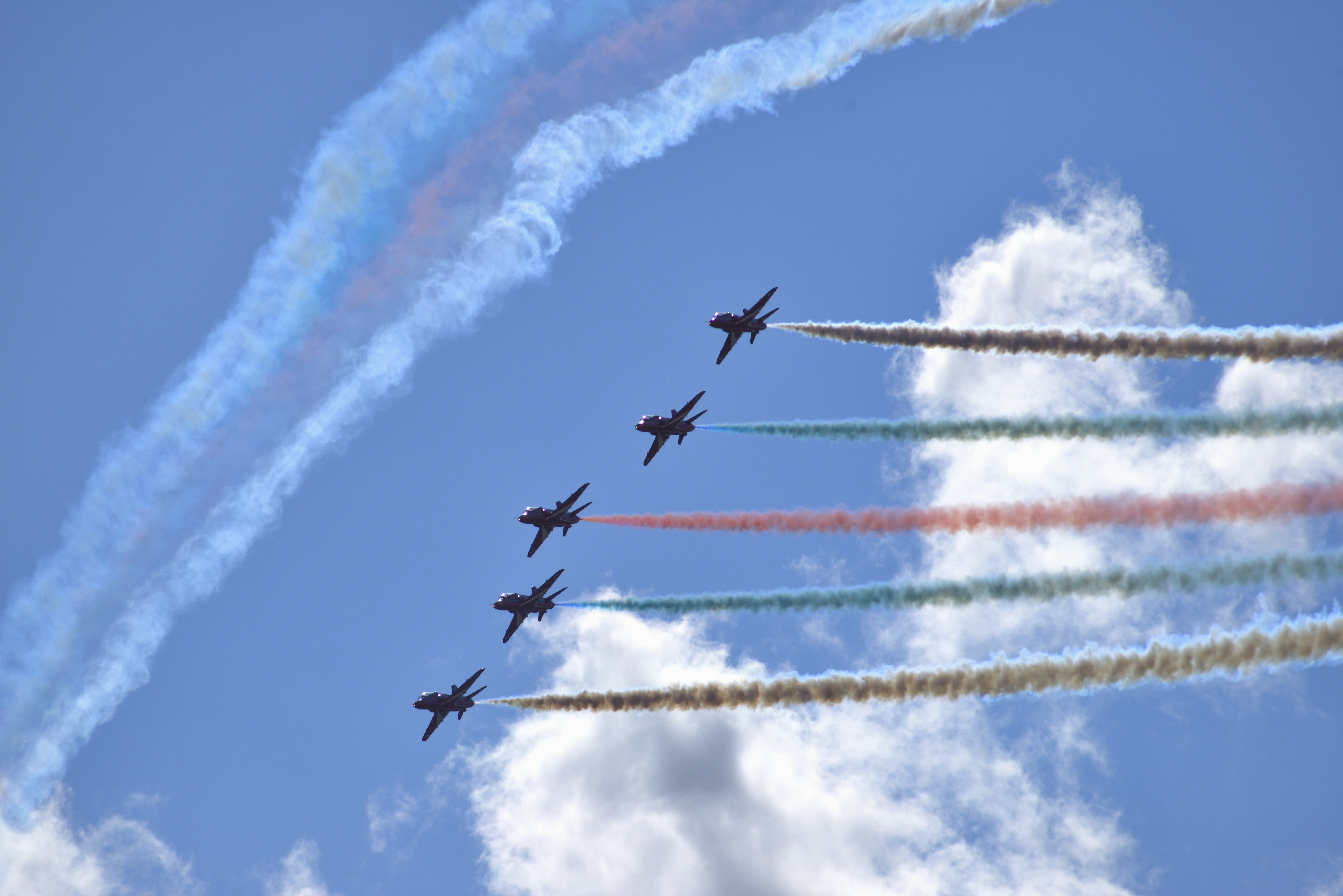 The Red Arrows, the world-famous display team of the Royal Air Force, soar over Roskilde Airport during the Roskilde Airshow 2025.