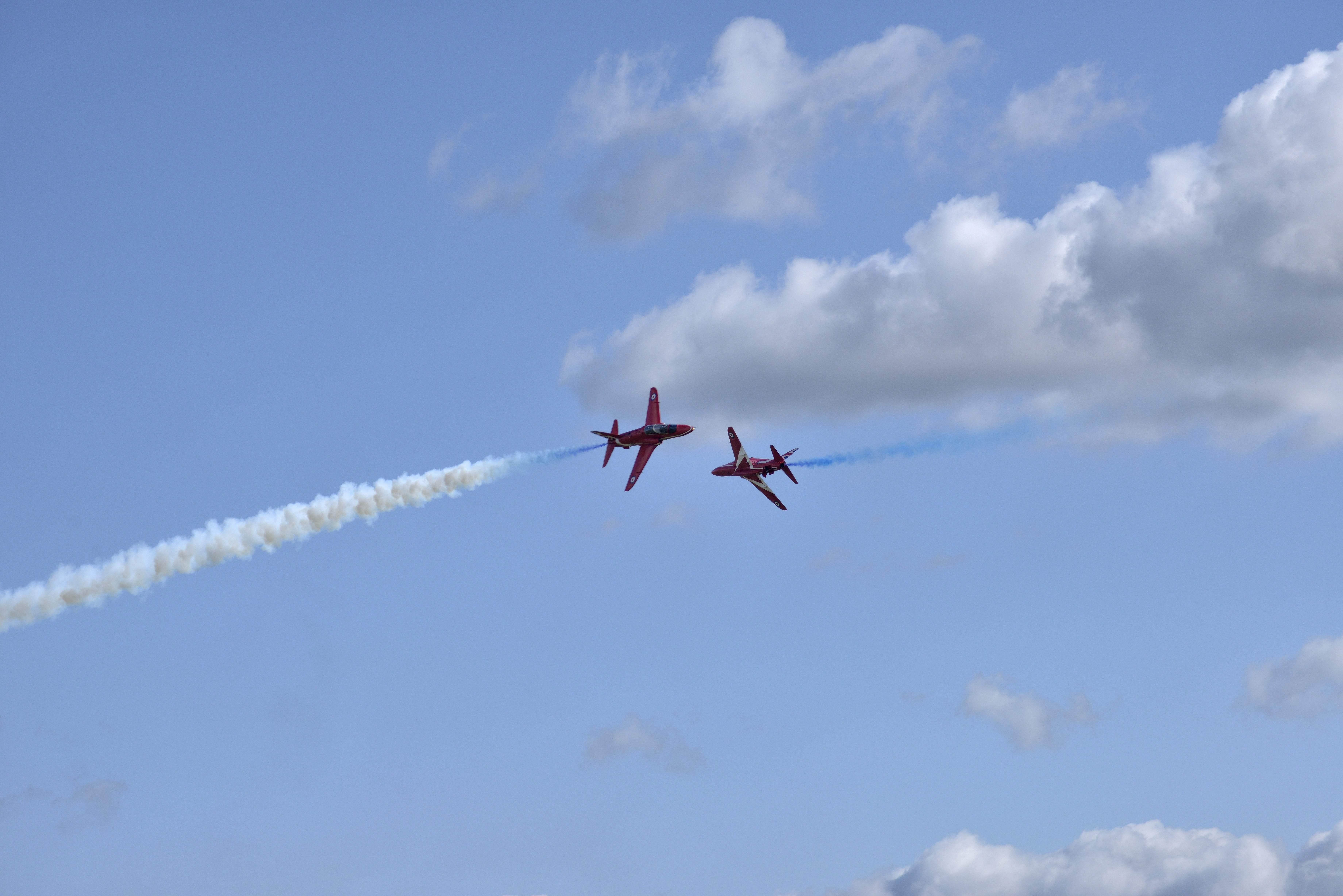 The Red Arrows, the world-famous display team of the Royal Air Force, soar over Roskilde Airport during the Roskilde Airshow 2025.