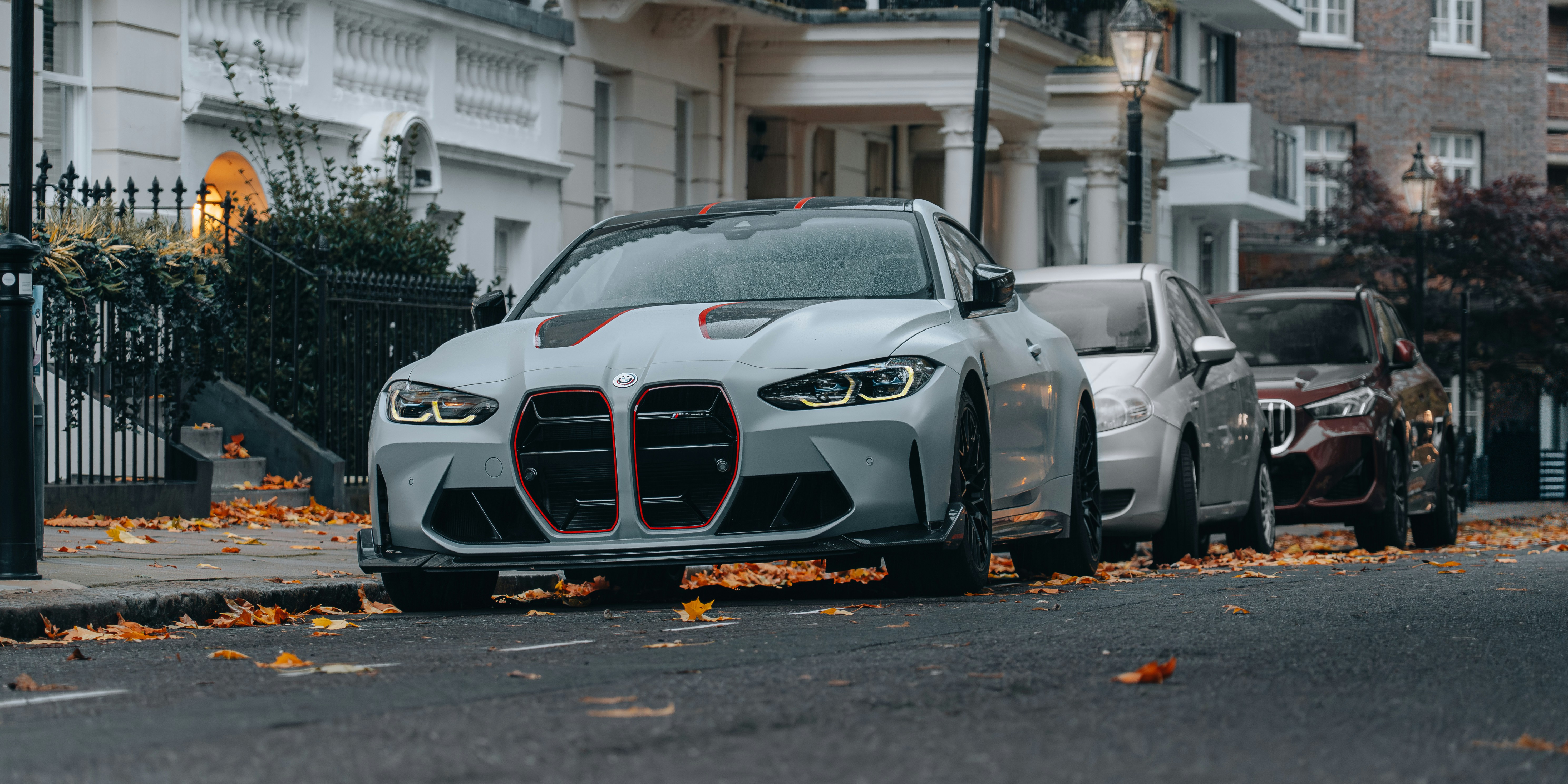 A beautiful BMW M4 CSI in the rain in autumn