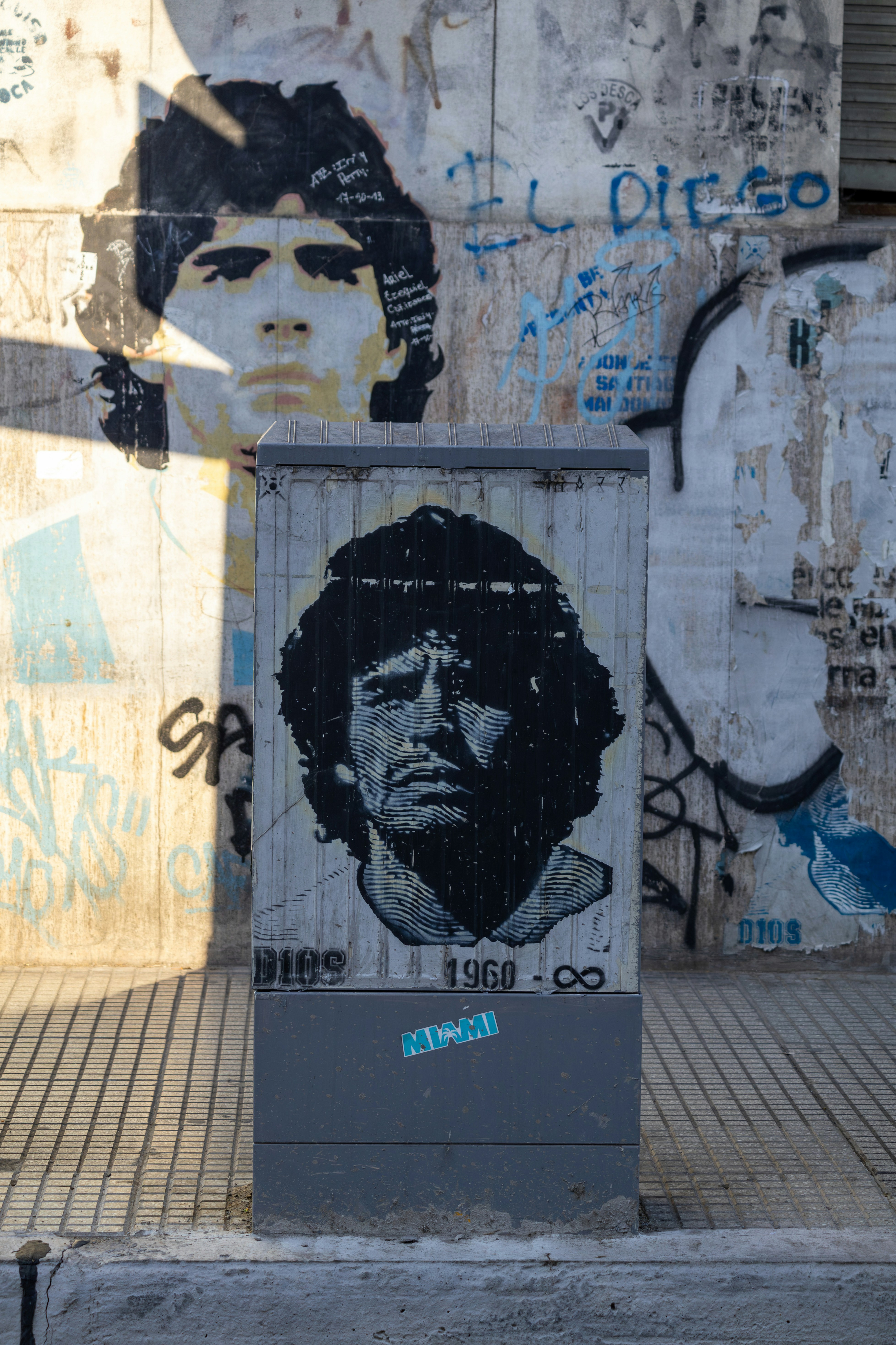 Face in the Graffiti Frame: A Portrait Emerges from Urban Layering