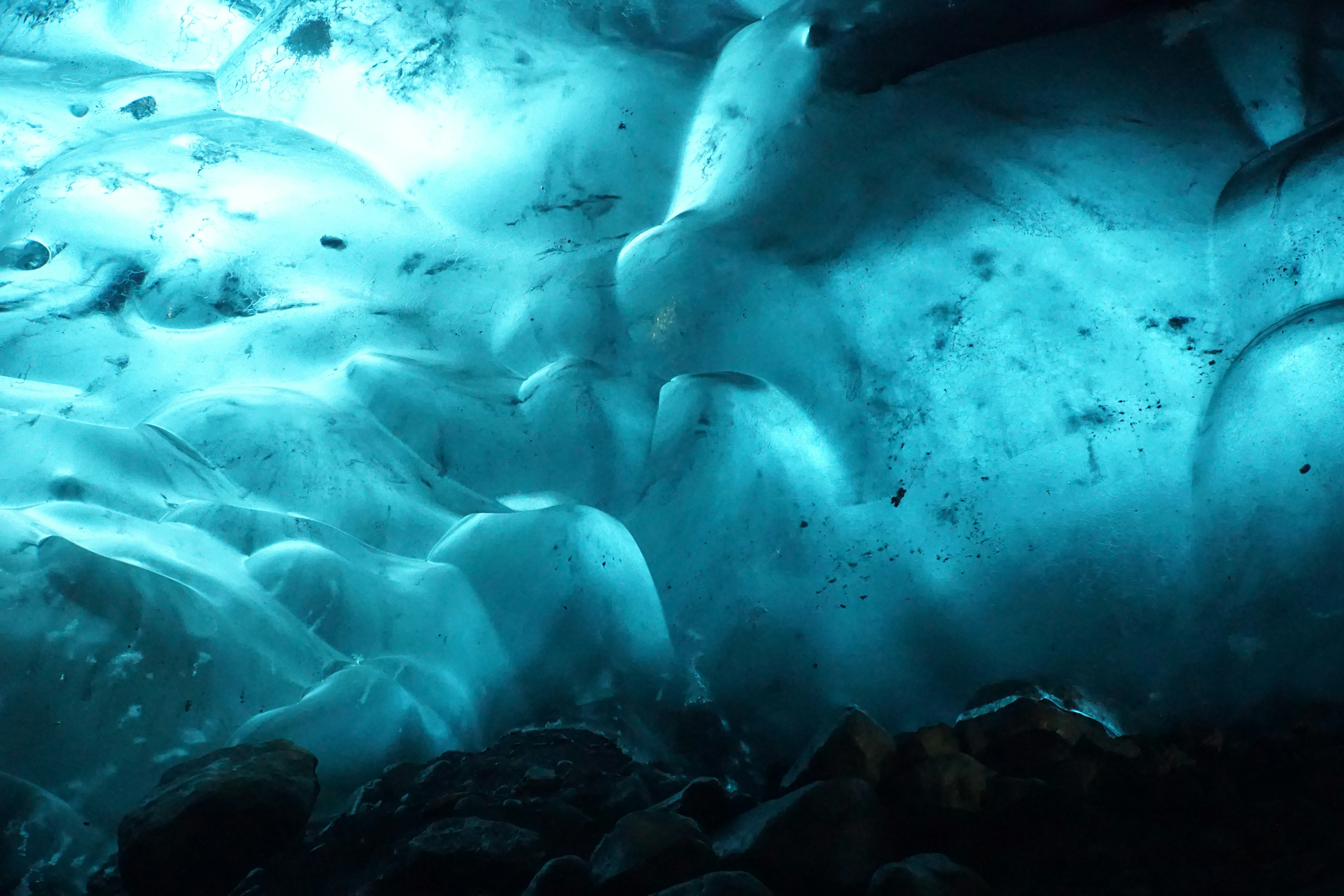 Blue Ice Cathedral: Light Sifts Through a Frozen Cavern