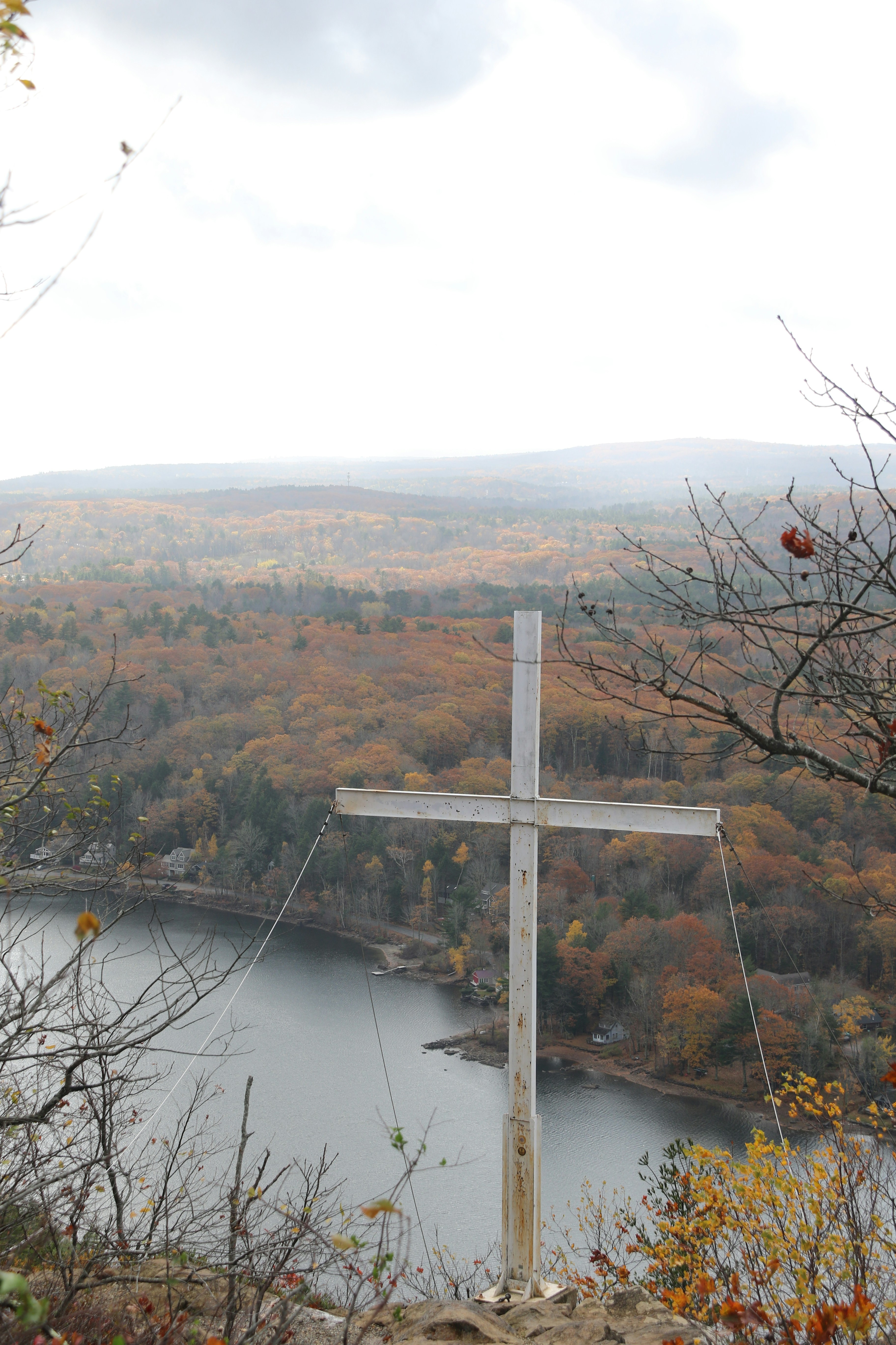 Cross on the Hill: Autumn River Valley from a Cliffside Overlook