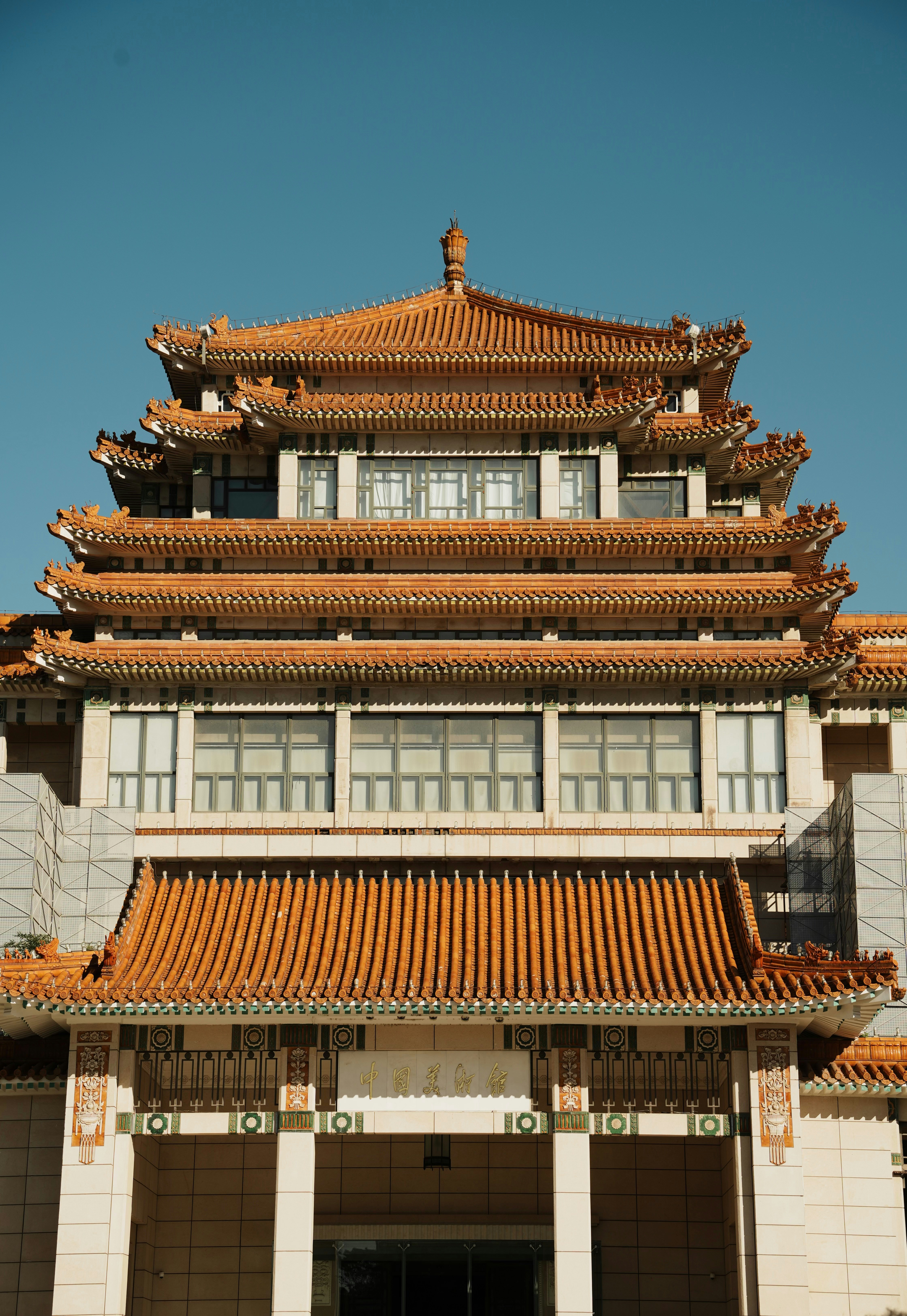 Amber Crown of the Pagoda: Tiered Roofs Against a Clear Sky