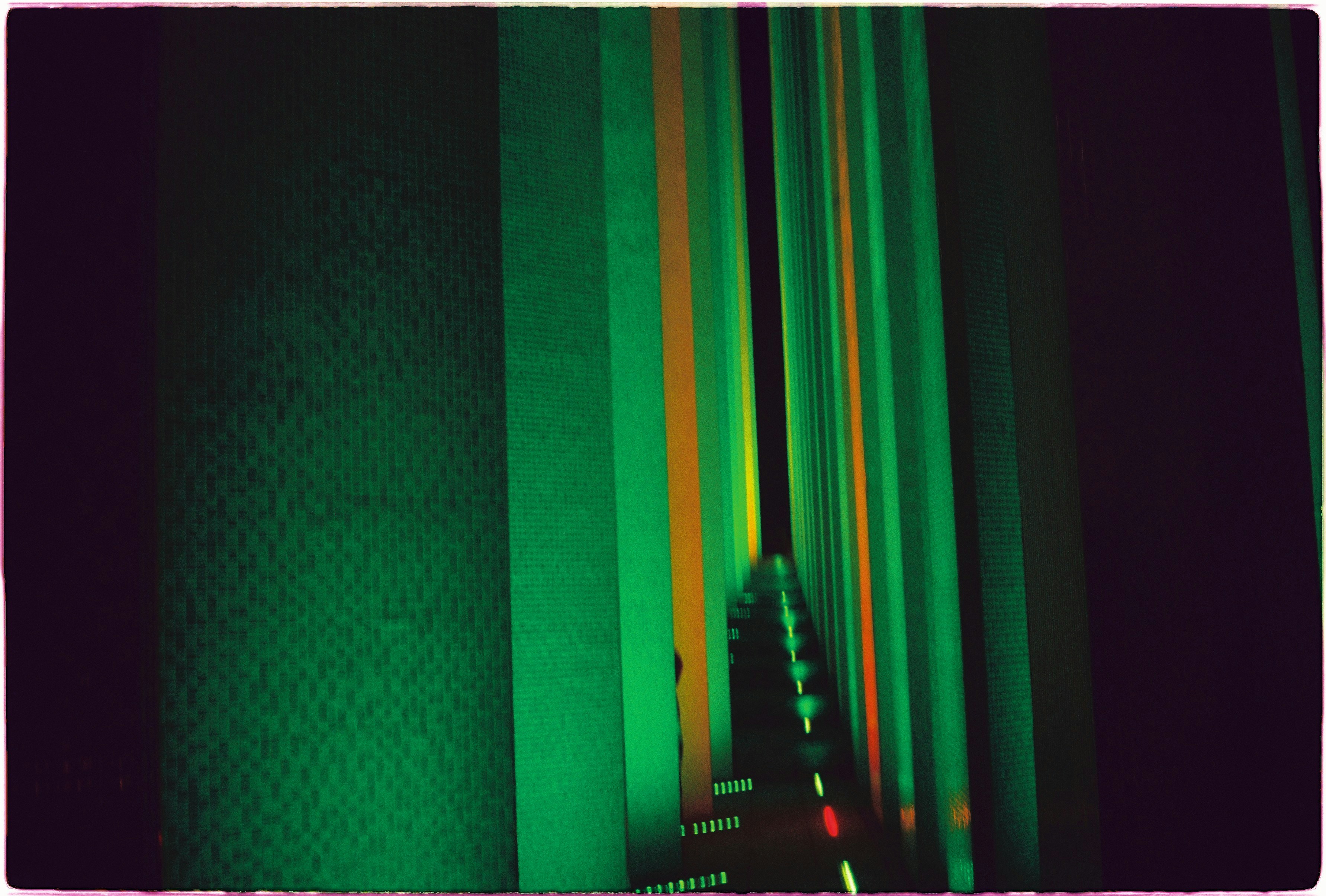 Neon Corridor: Green Lines Receding to a Vanishing Point