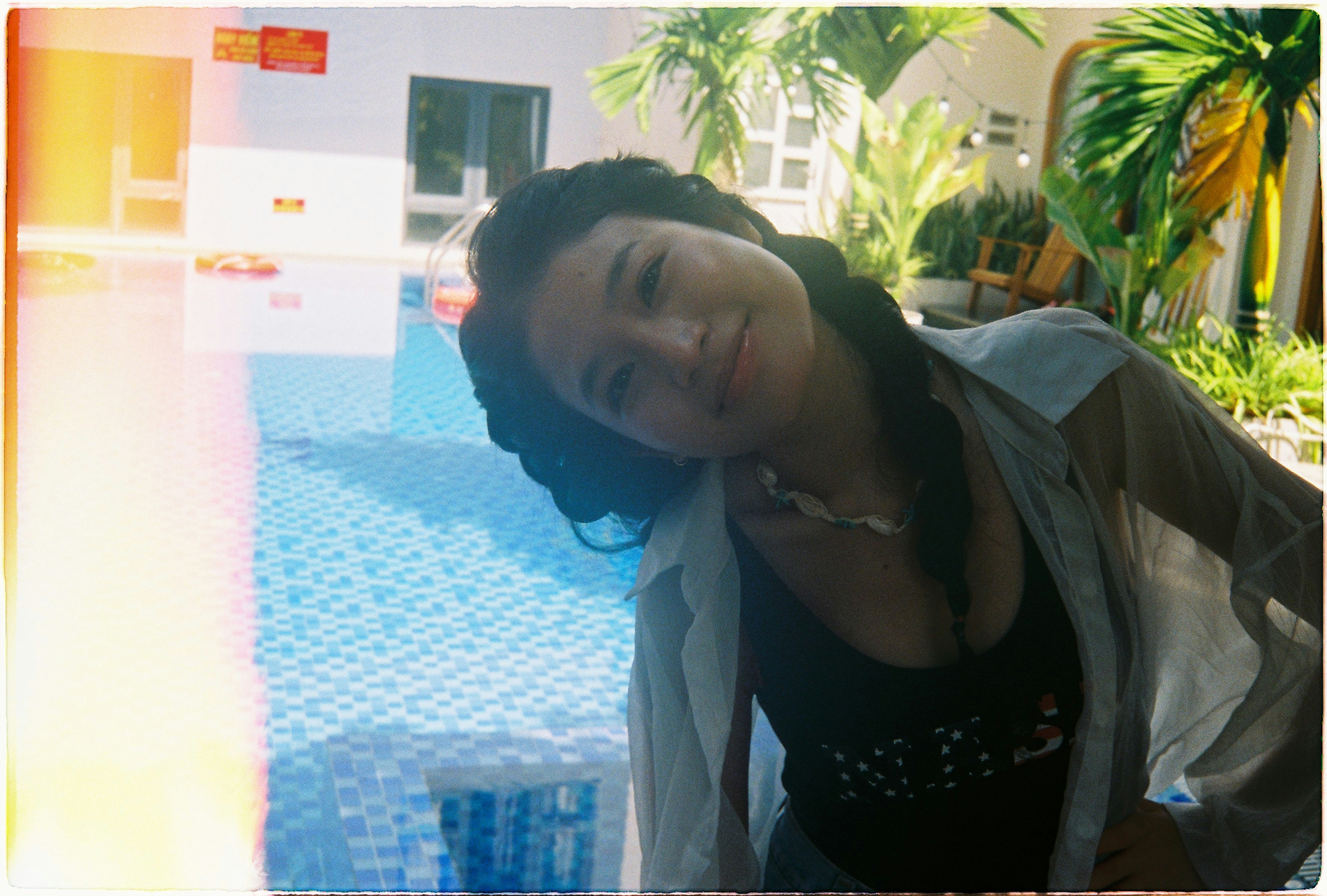 Poolside Portrait: A Gentle Lean Toward the Sunshine