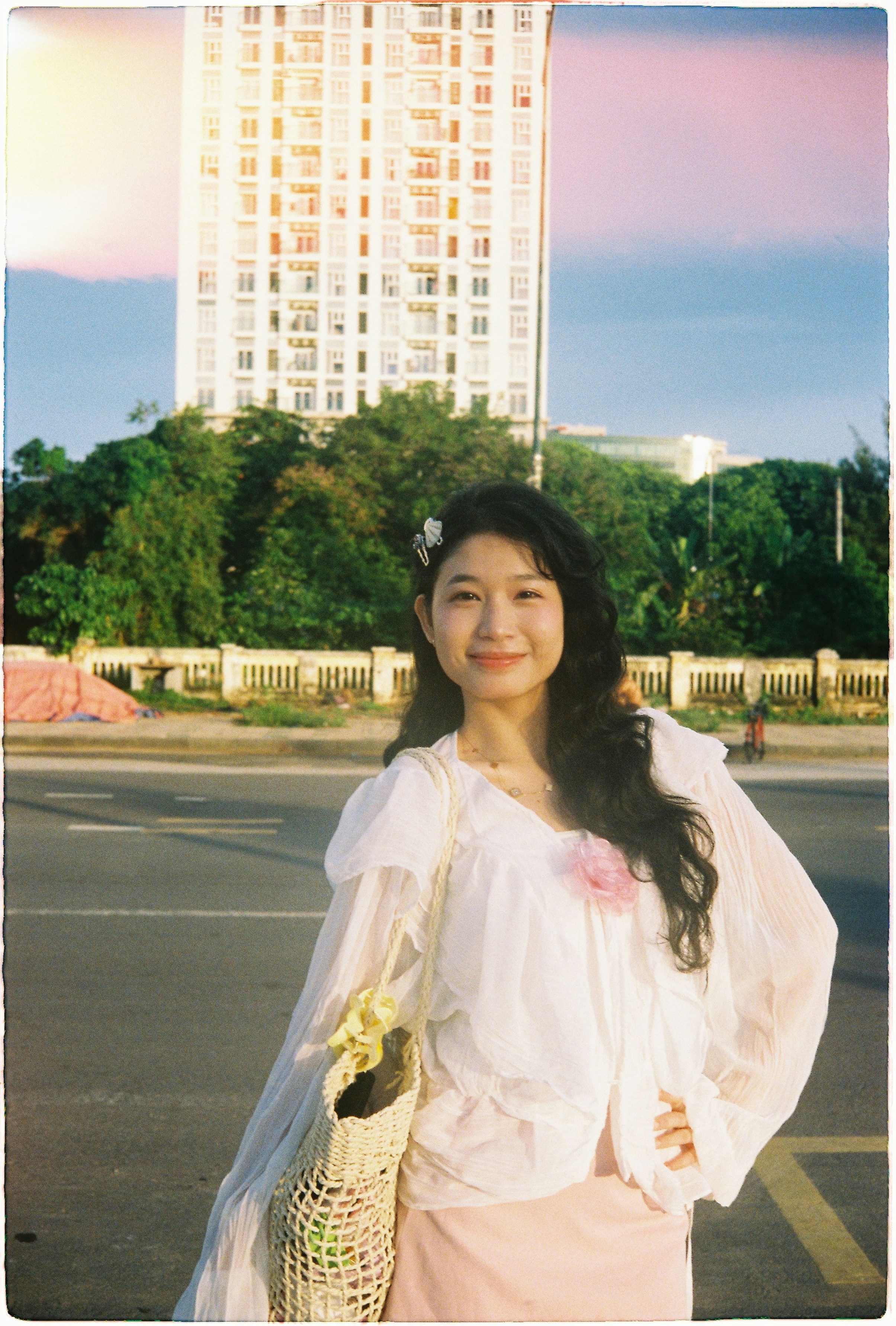 Pastel Portrait: A Quiet Smile Beneath a City Skyline