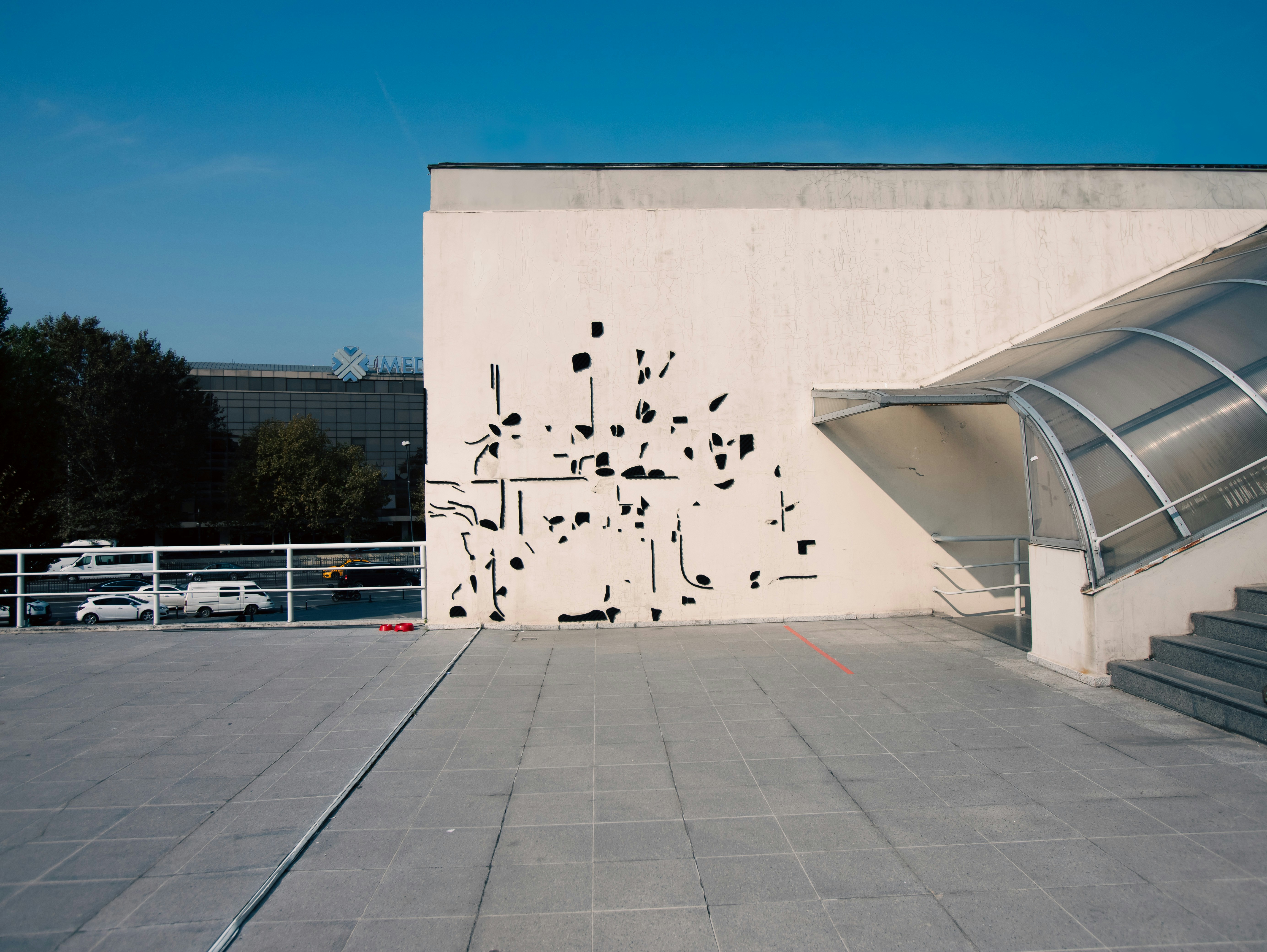 Abstract art on a building facade under blue sky photo – Free Graphic ...