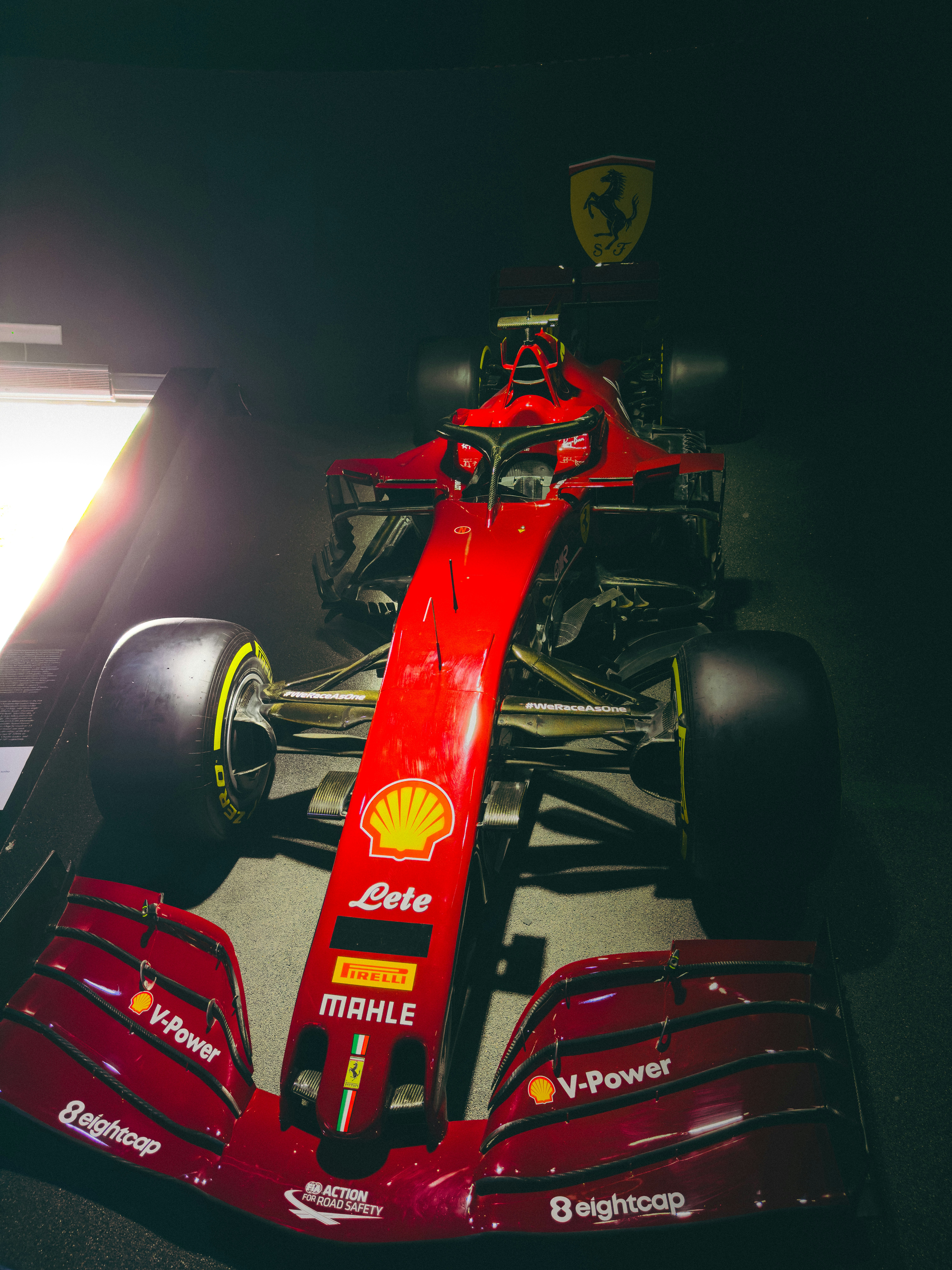 Ferrari SF21 Formula 1 race car on display at Museo Ferrari Maranello, Italy. Driven in the 2021 F1 season, this car represents Ferrari’s cutting-edge aerodynamics, hybrid power, and continued pursuit of racing excellence.