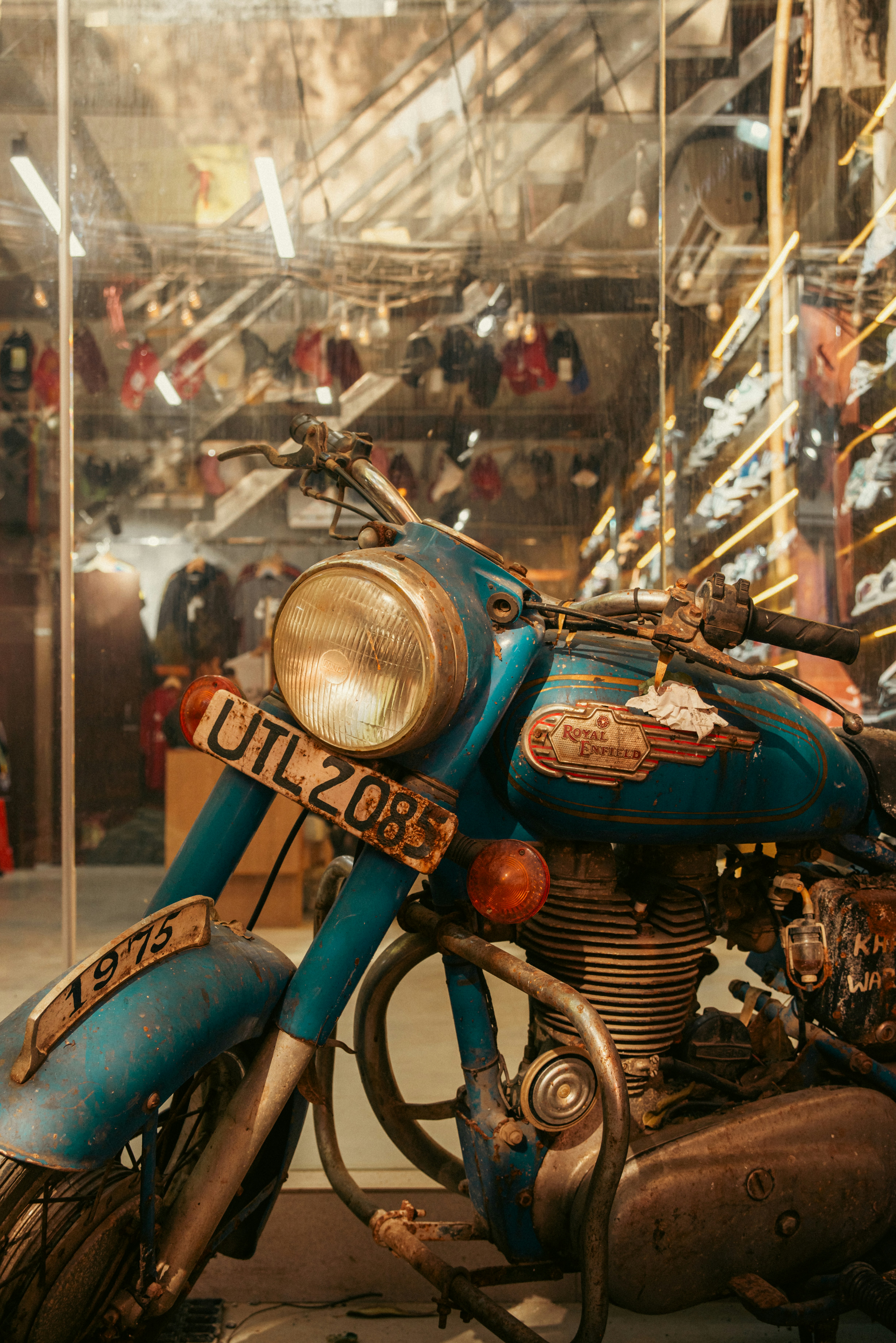 Blue Royal Enfield in a Glass-Front Vintage Shop: a 1973 Relic