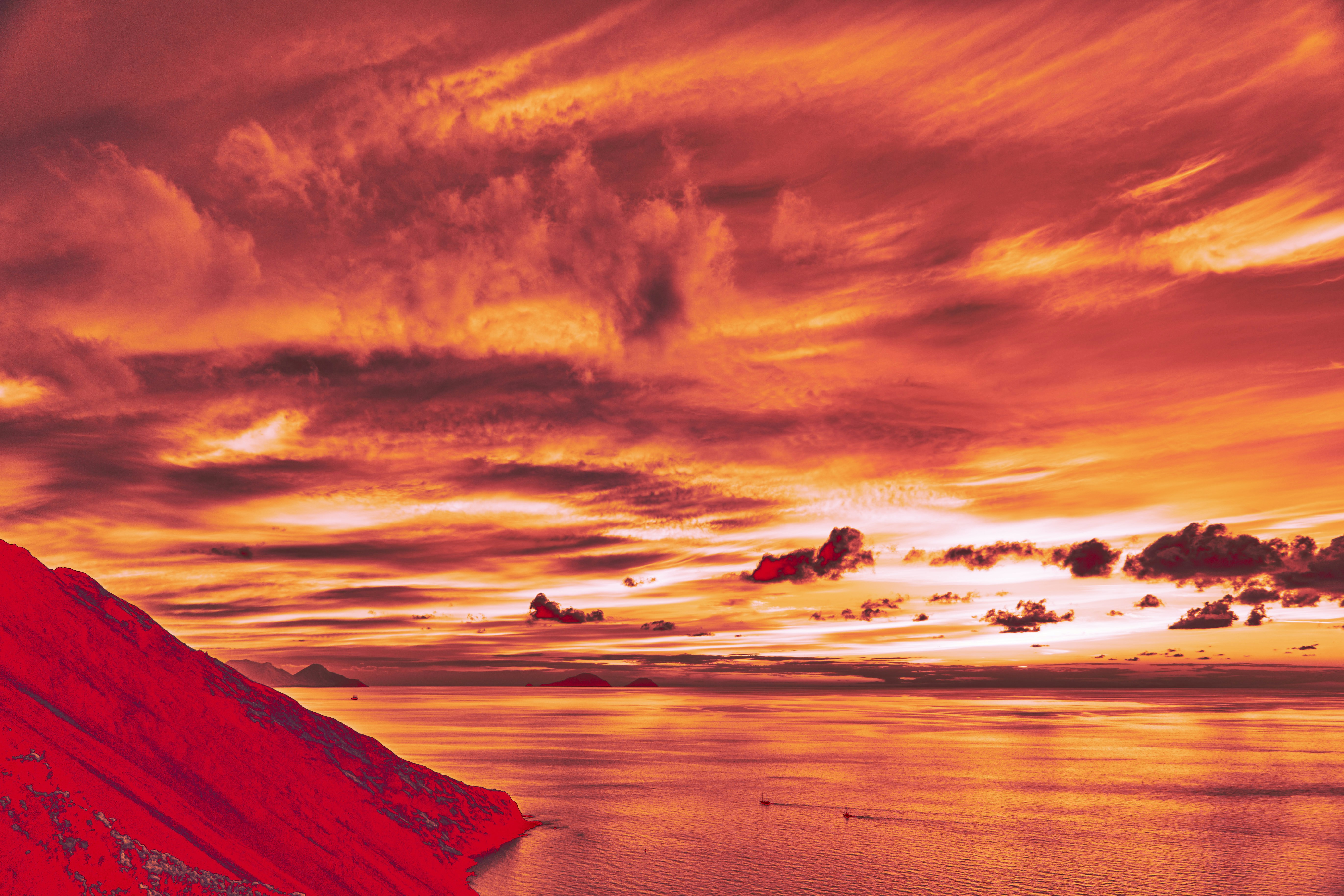 Ruby Skies Over the Red Cliff by the Sea