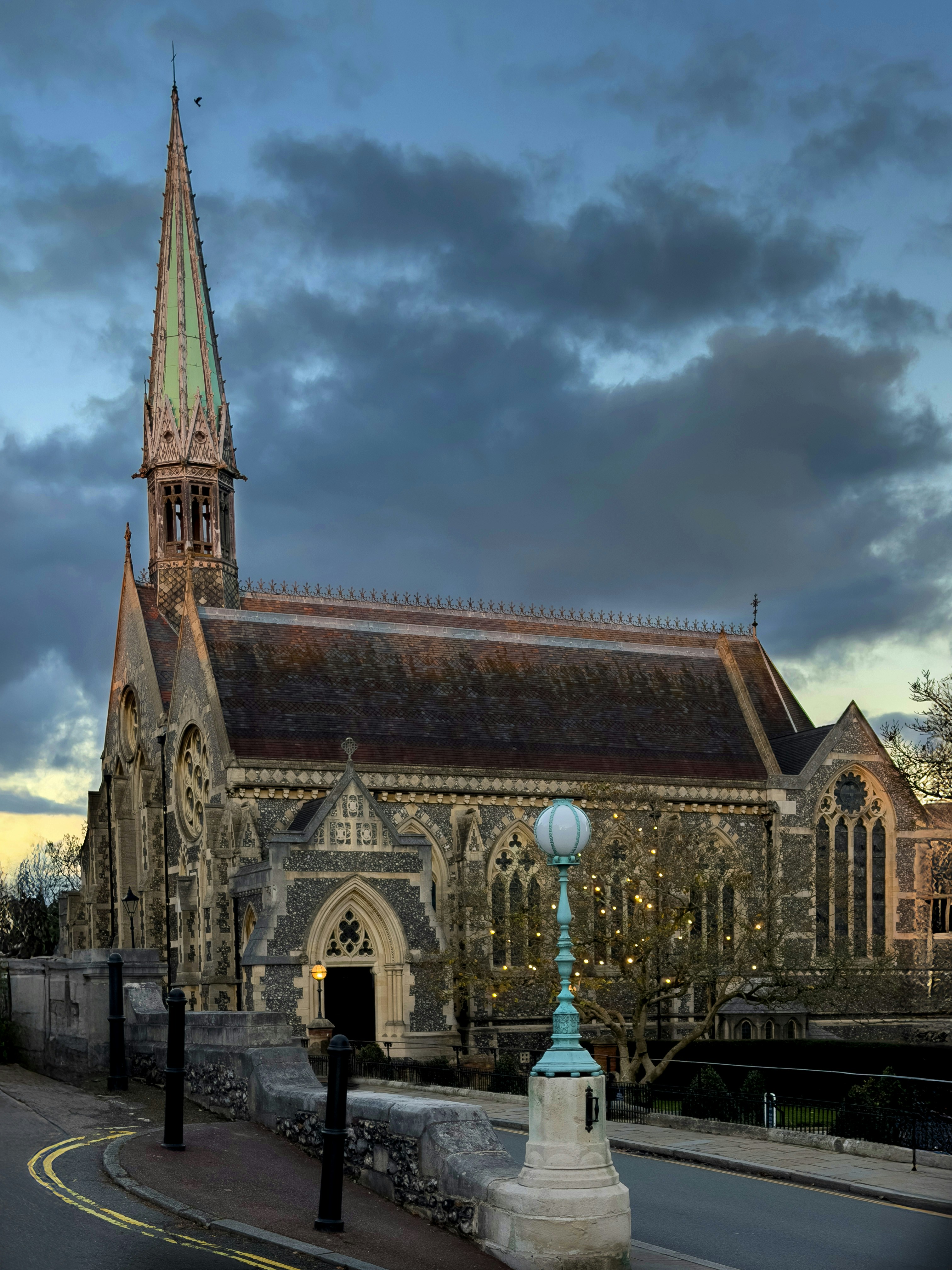 Dusk at the Spire: Gothic Church Under Brooding Clouds