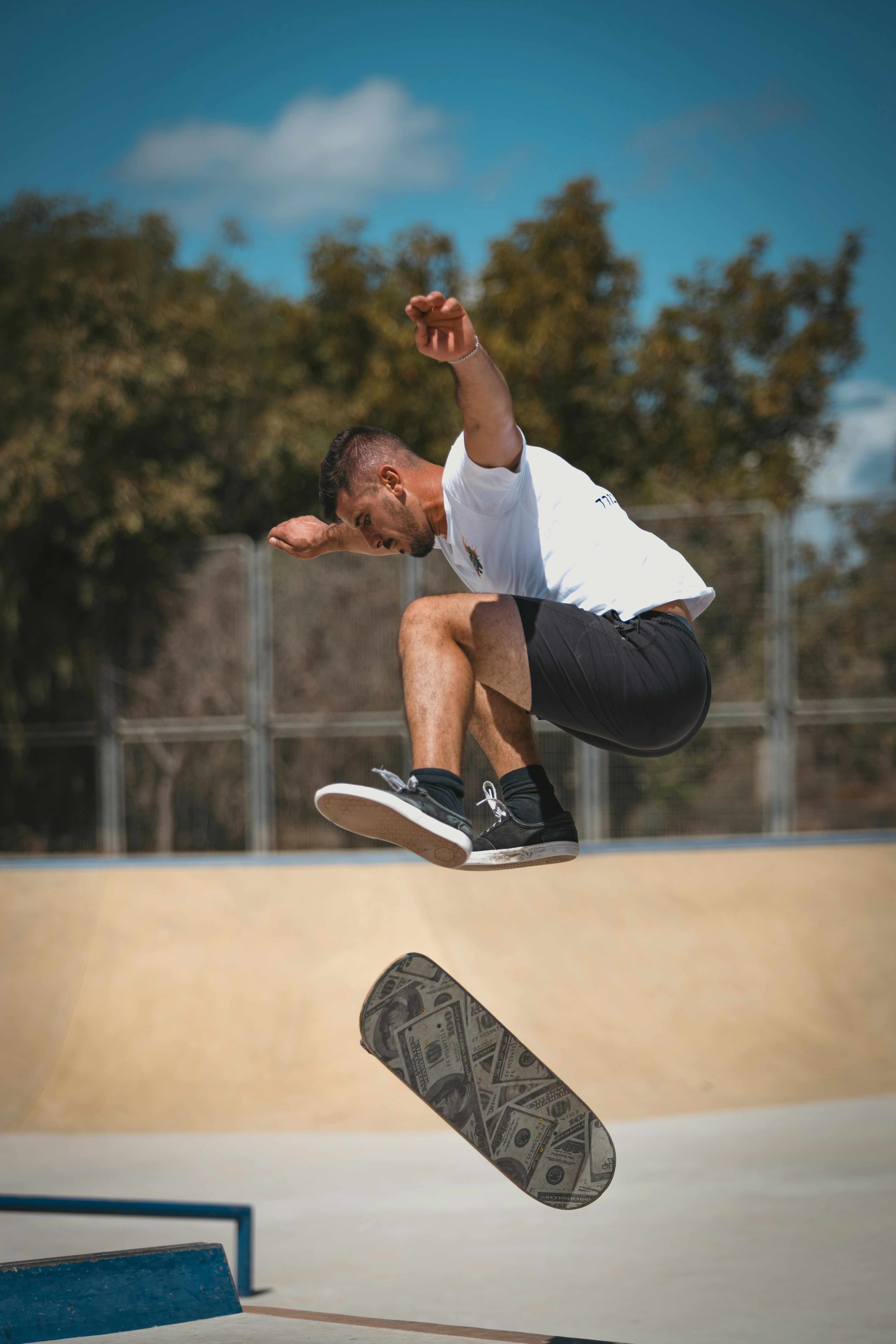 Man performing a skateboard trick in a skatepark photo – Free Adventure ...