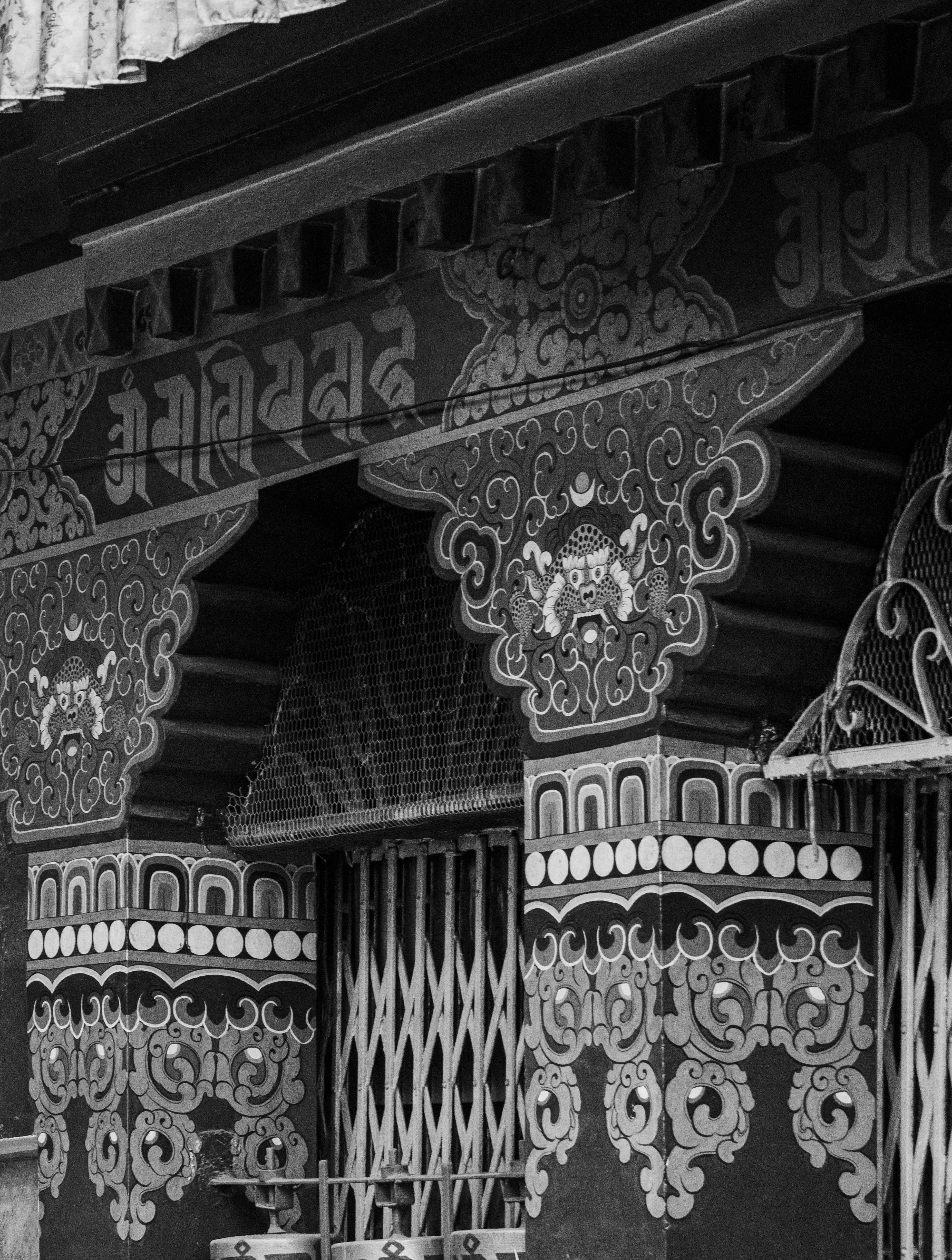 Majnu ka Tila, also known as “Little Tibet,” is a vibrant Tibetan colony in Delhi known for its monasteries, colorful facades, and distinct Himalayan architecture. Established in the 1960s by Tibetan refugees, the neighborhood has become a cultural landmark blending spirituality, community, and commerce. Its temples and prayer flags reflect Tibetan Buddhist heritage, while the intricate designs and motifs—like those seen on this building—represent traditional artistry preserved through generations.