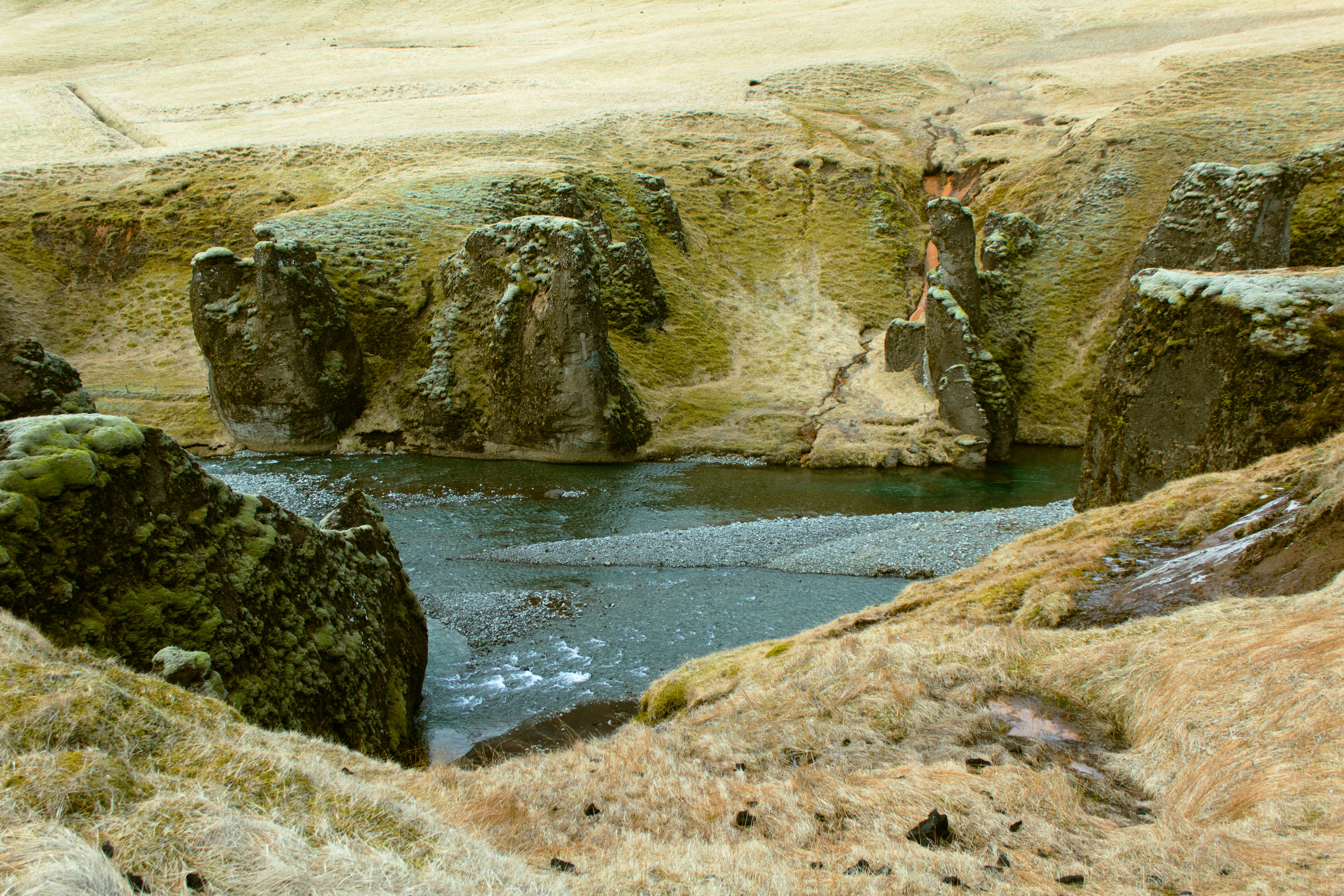 Coastal Echoes: A Narrow Inlet Framed by Weathered Cliffs
